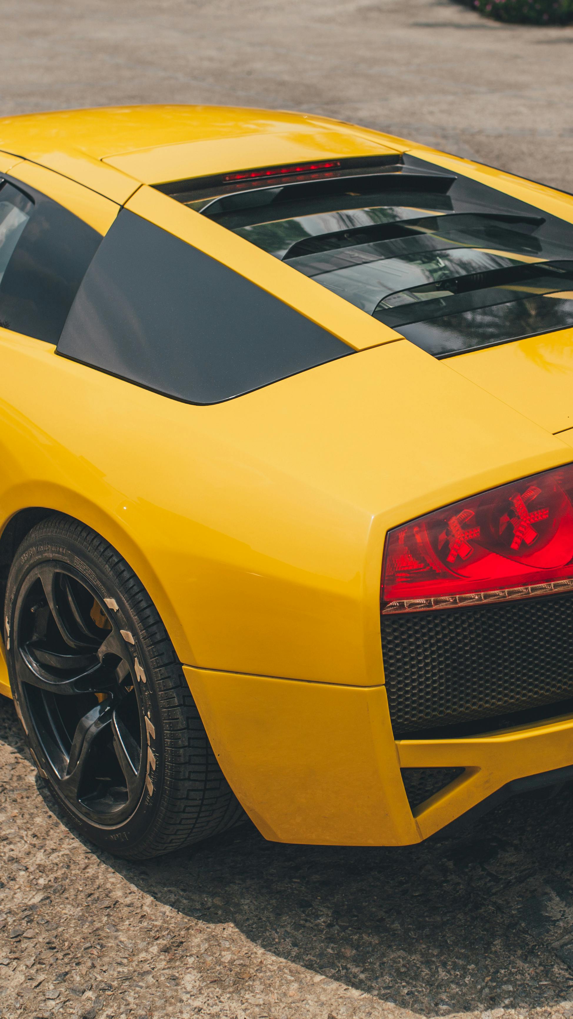 A Yellow Sport Car on a Road · Free Stock Photo