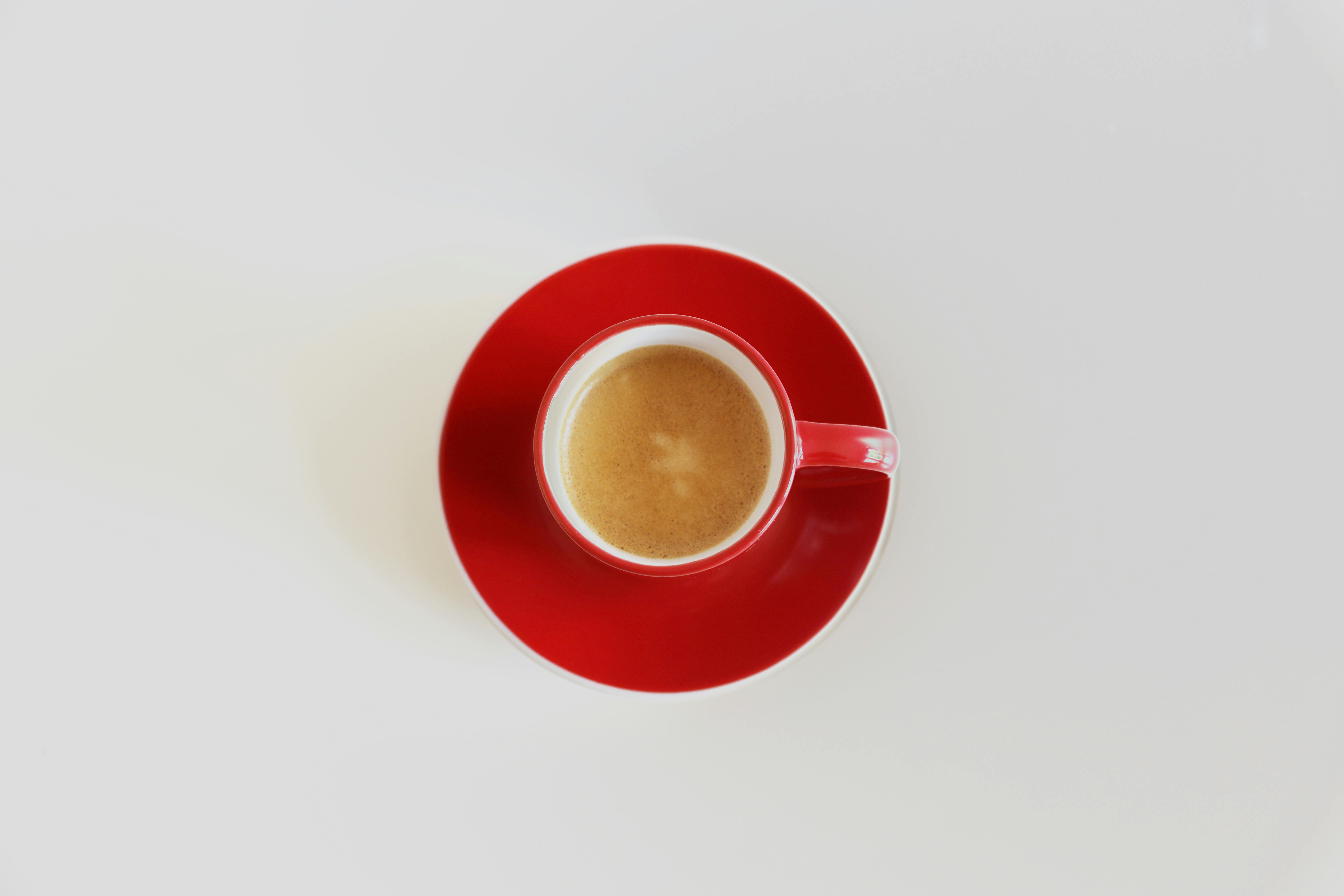 Flat Lay of Coffee in a Red Cup · Free Stock Photo
