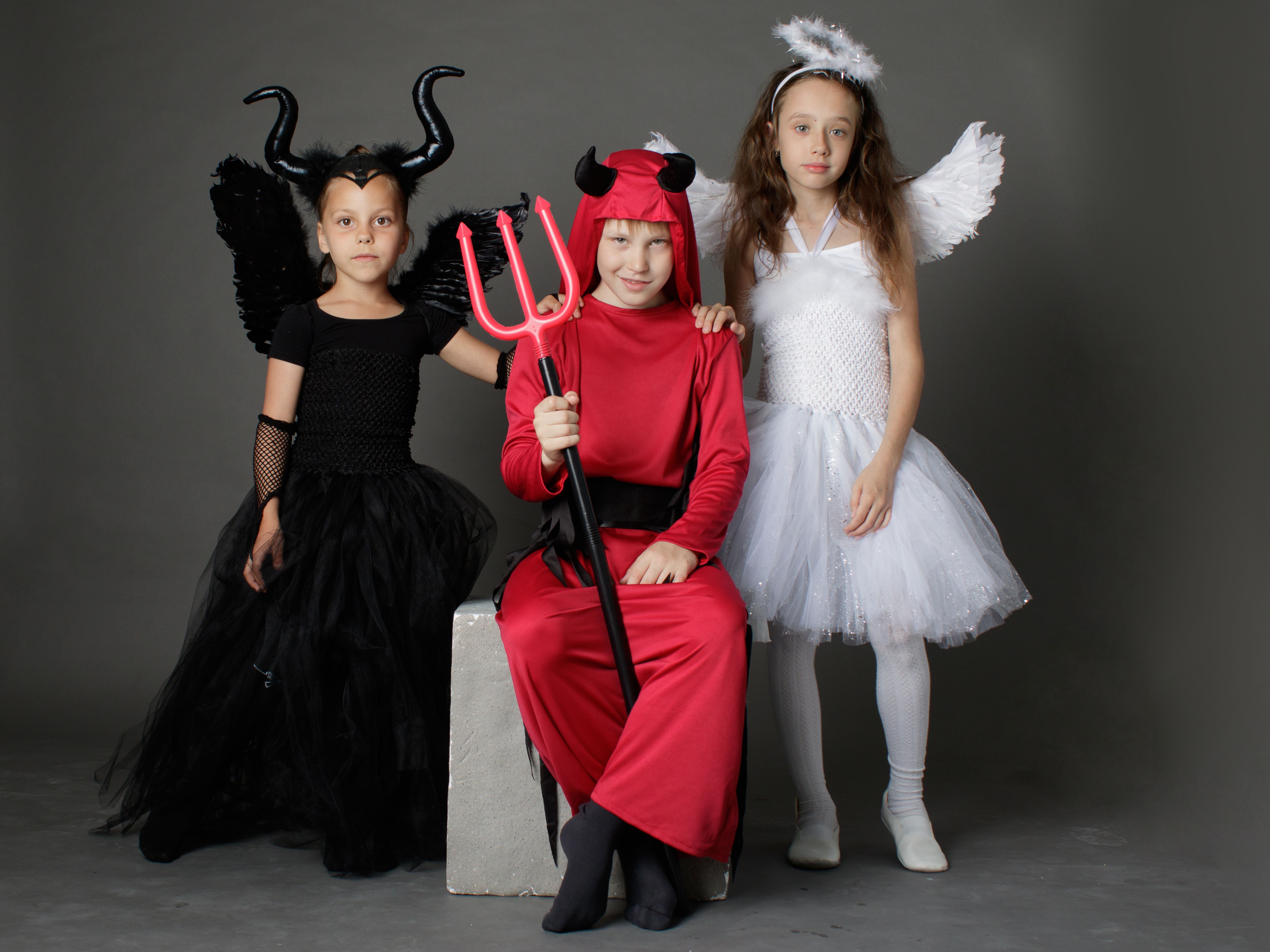Three Kids Wearing Halloween Costumes · Free Stock Photo