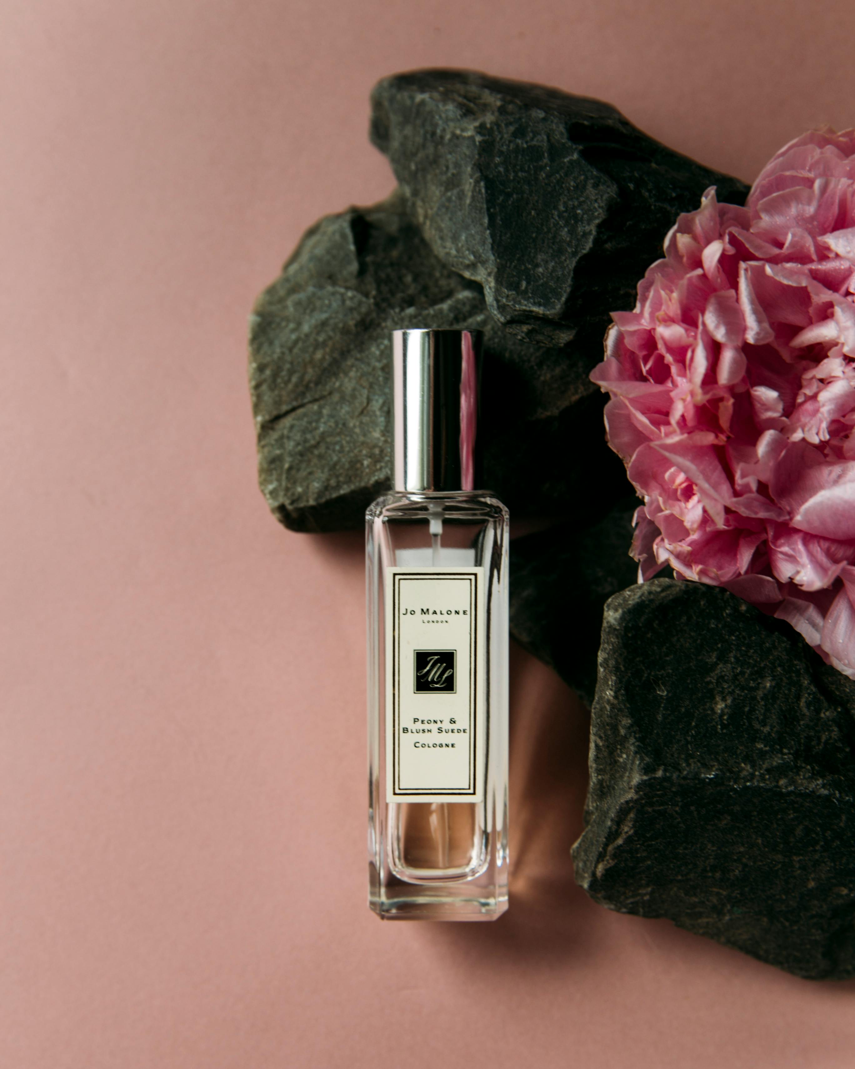 A Close-Up Shot of a Perfume Bottle · Free Stock Photo