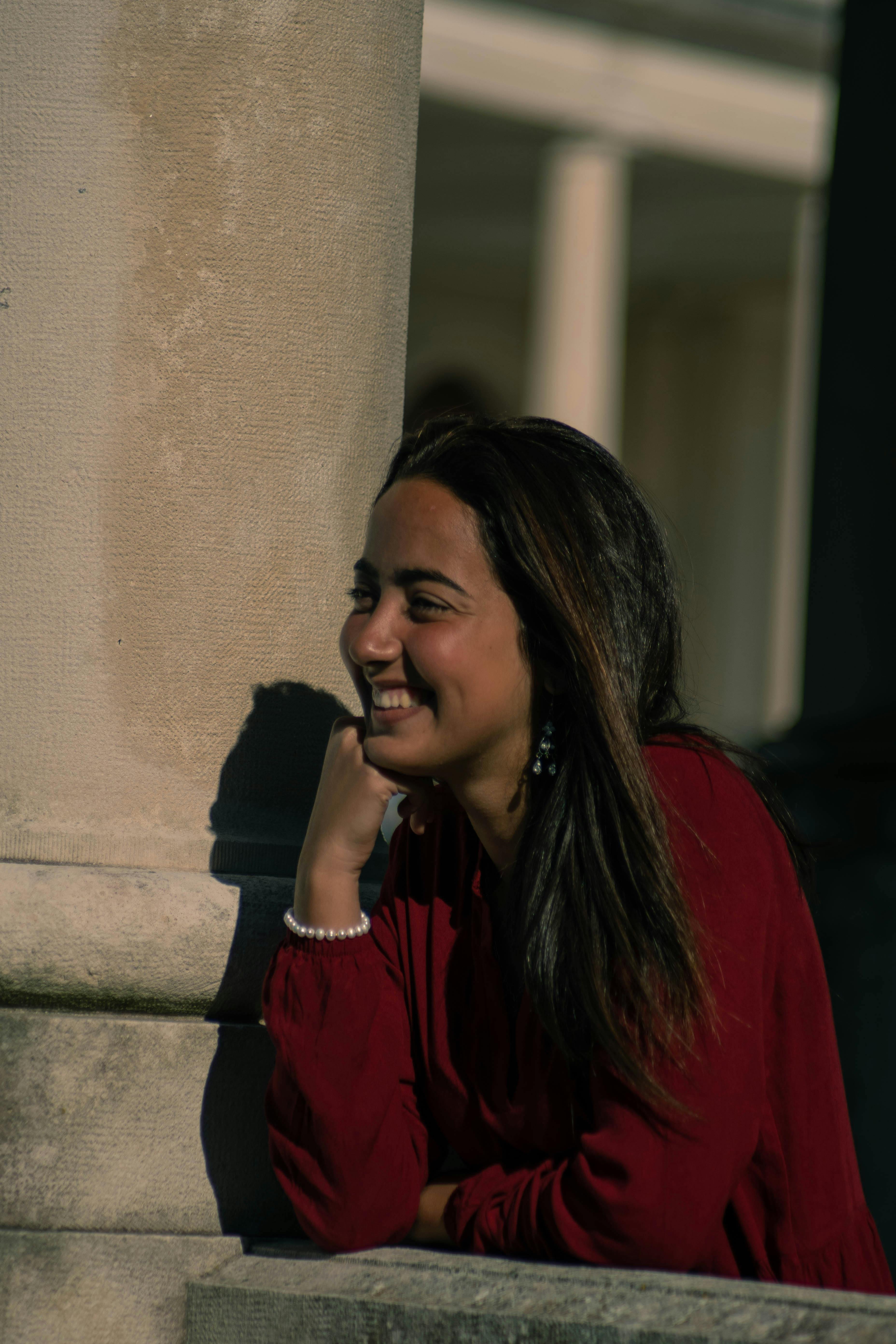 A Woman in Red Top Smiling · Free Stock Photo