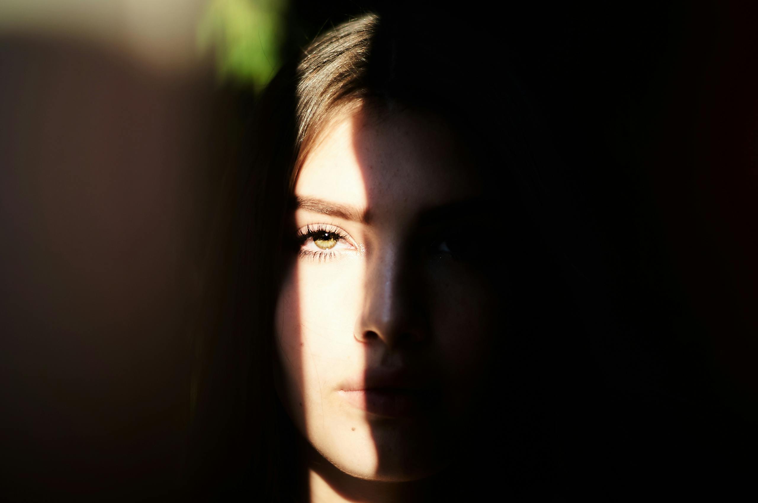 Beautiful Woman with Sunlight on Face · Free Stock Photo