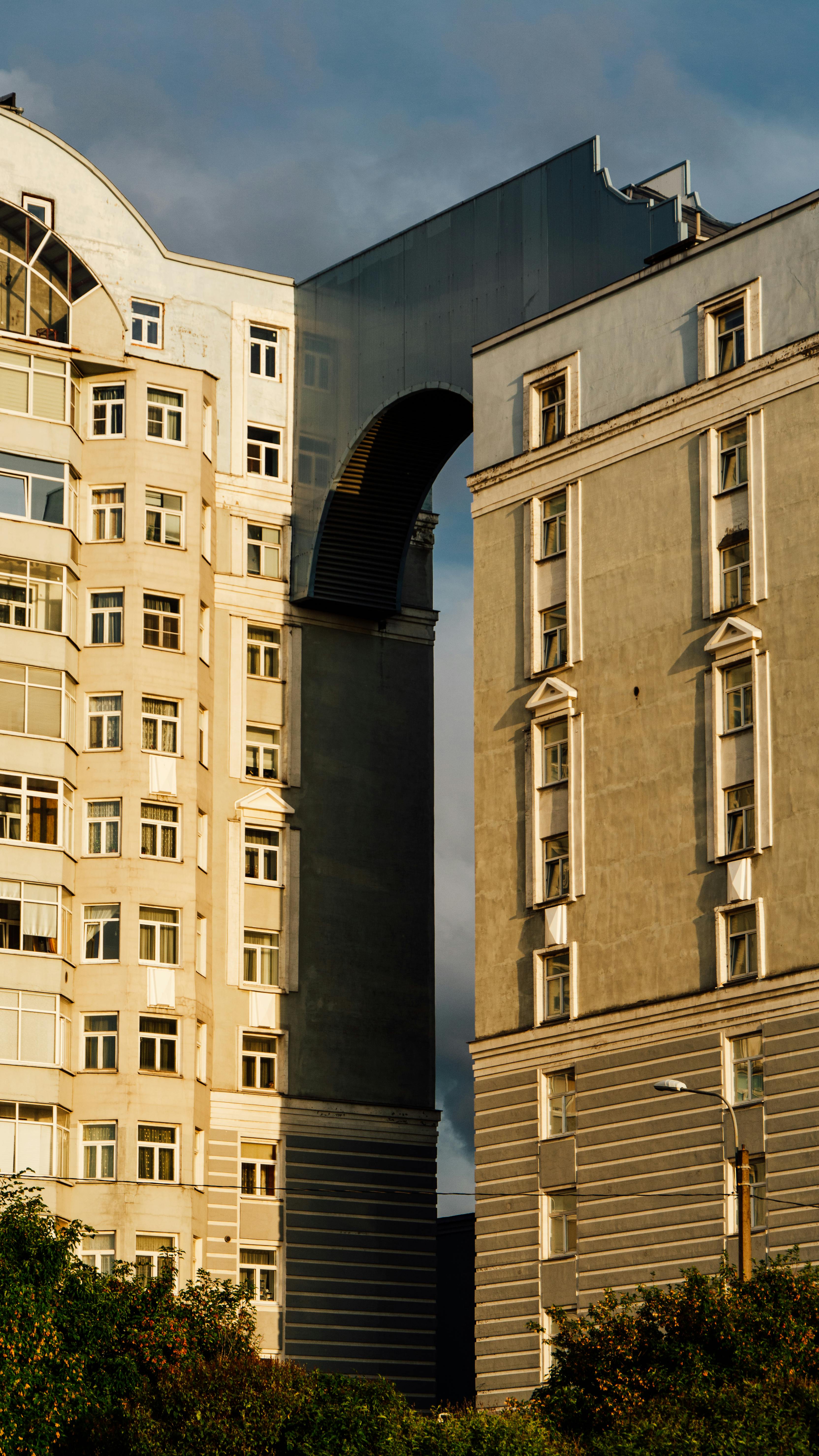 Buildings with Arches on City Street · Free Stock Photo