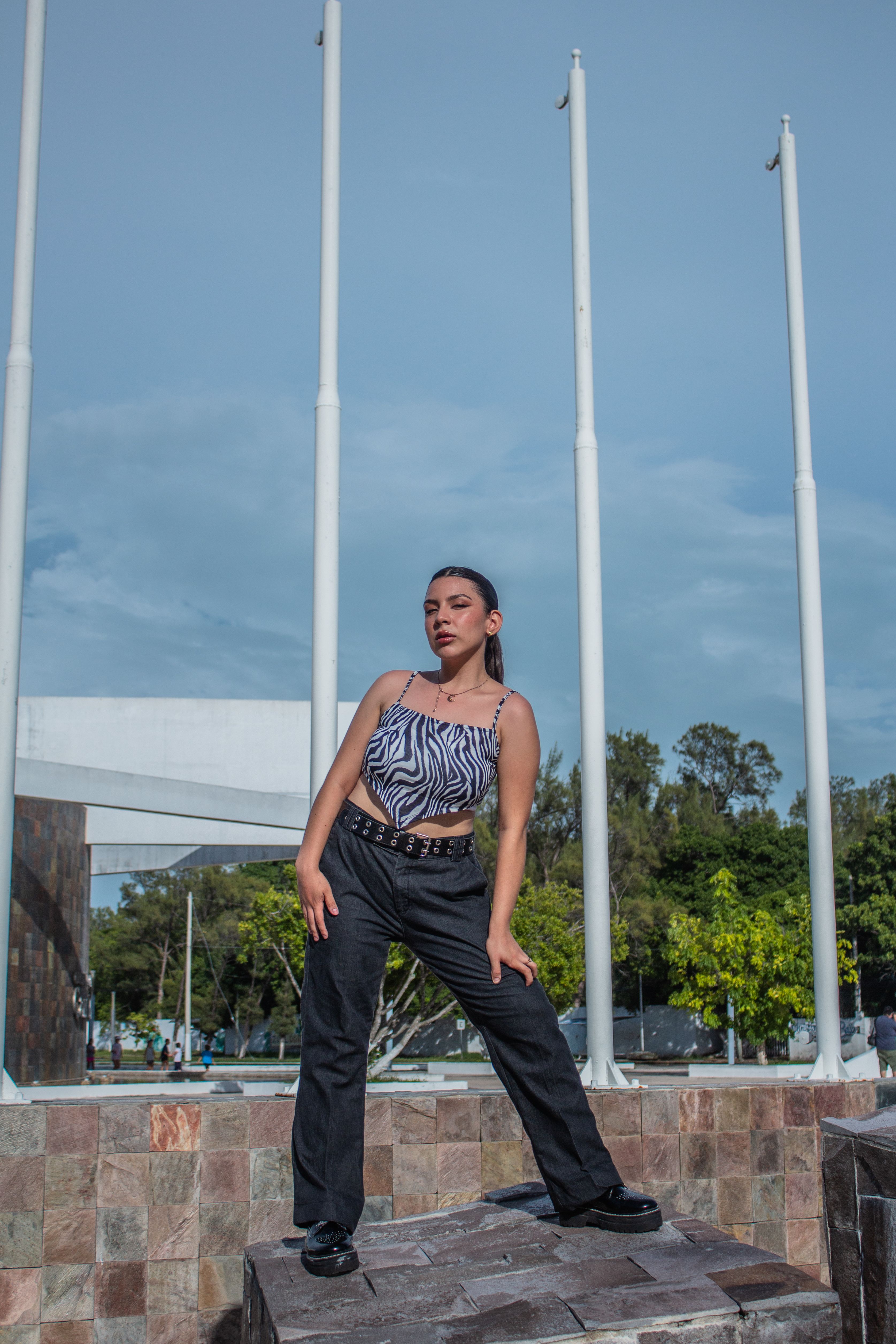 A Woman in Red Spaghetti Strap Top and Red Pants · Free Stock Photo