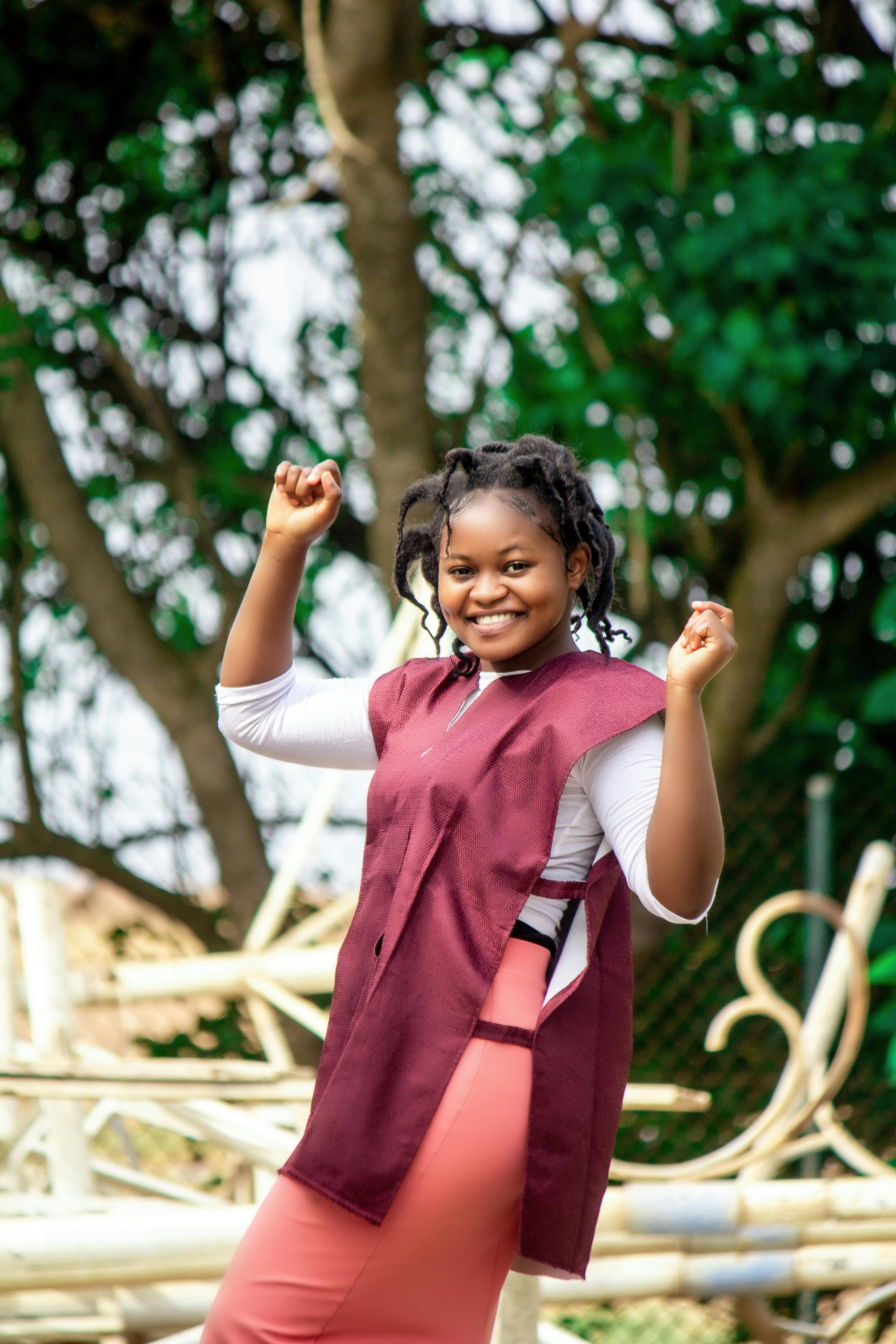 Dancing Young Woman with Dreadlocks · Free Stock Photo