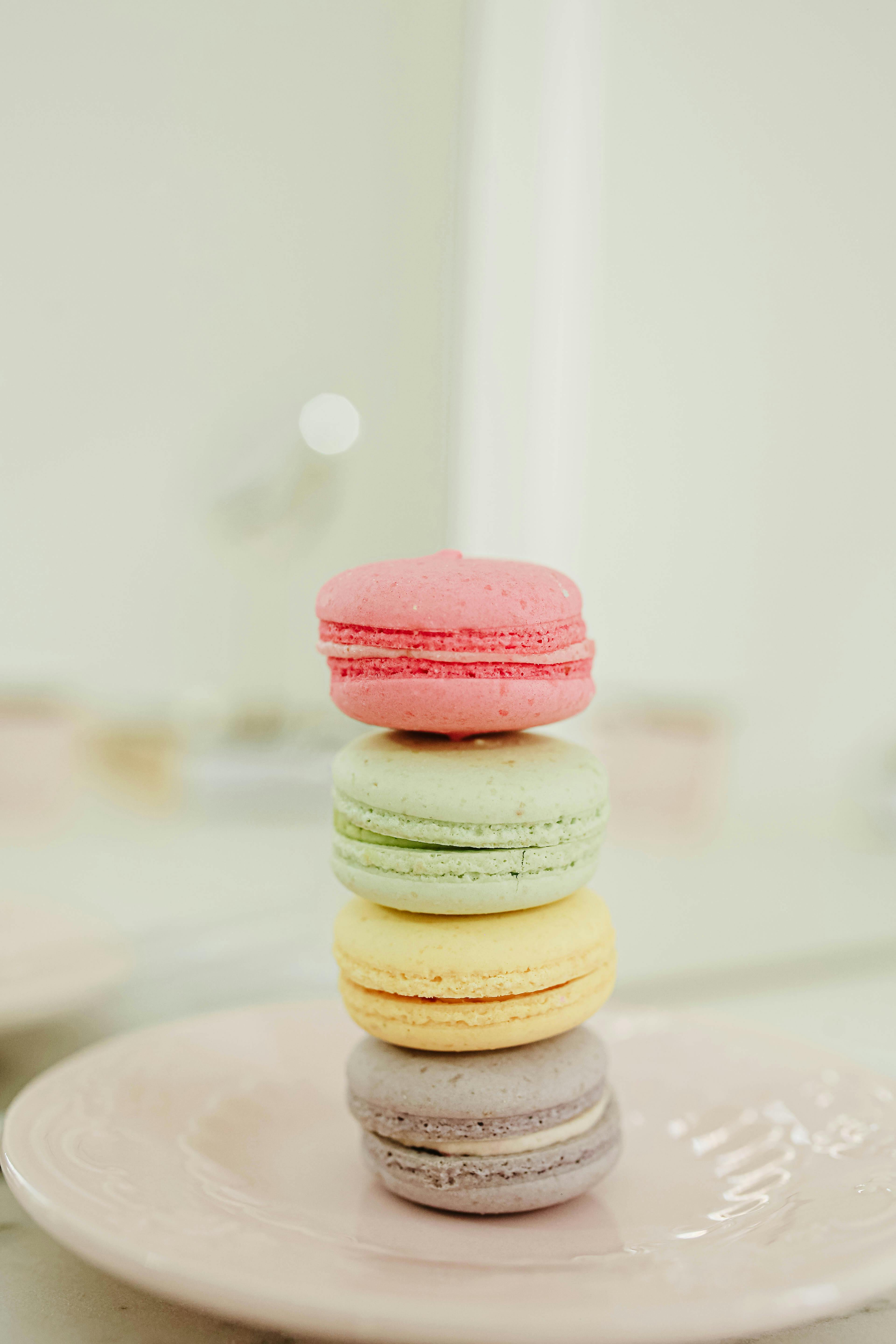 A Stack of Pastel Colored Macaroons on White Ceramic Plate · Free Stock ...