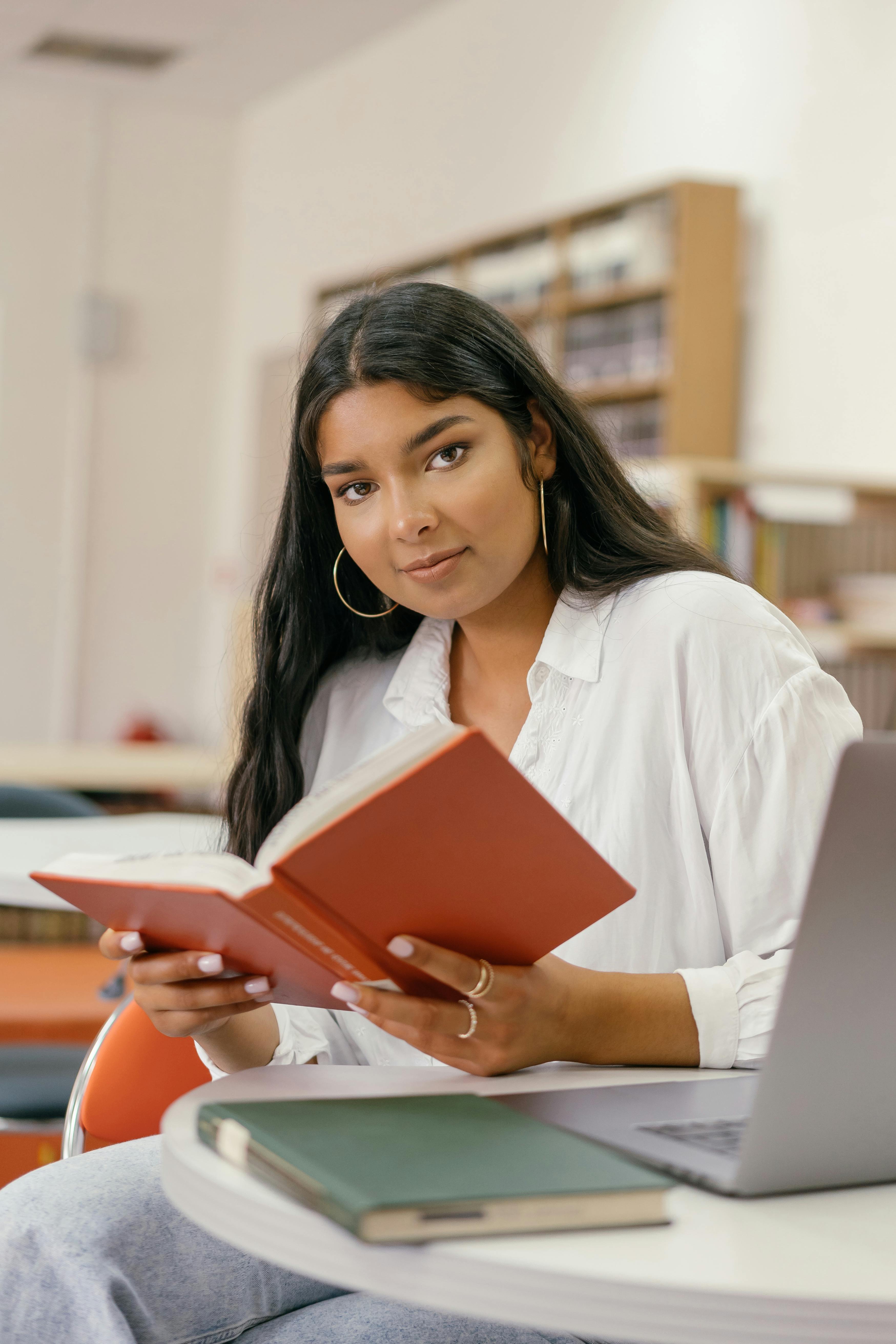 Photo Of Woman Reading Books · Free Stock Photo