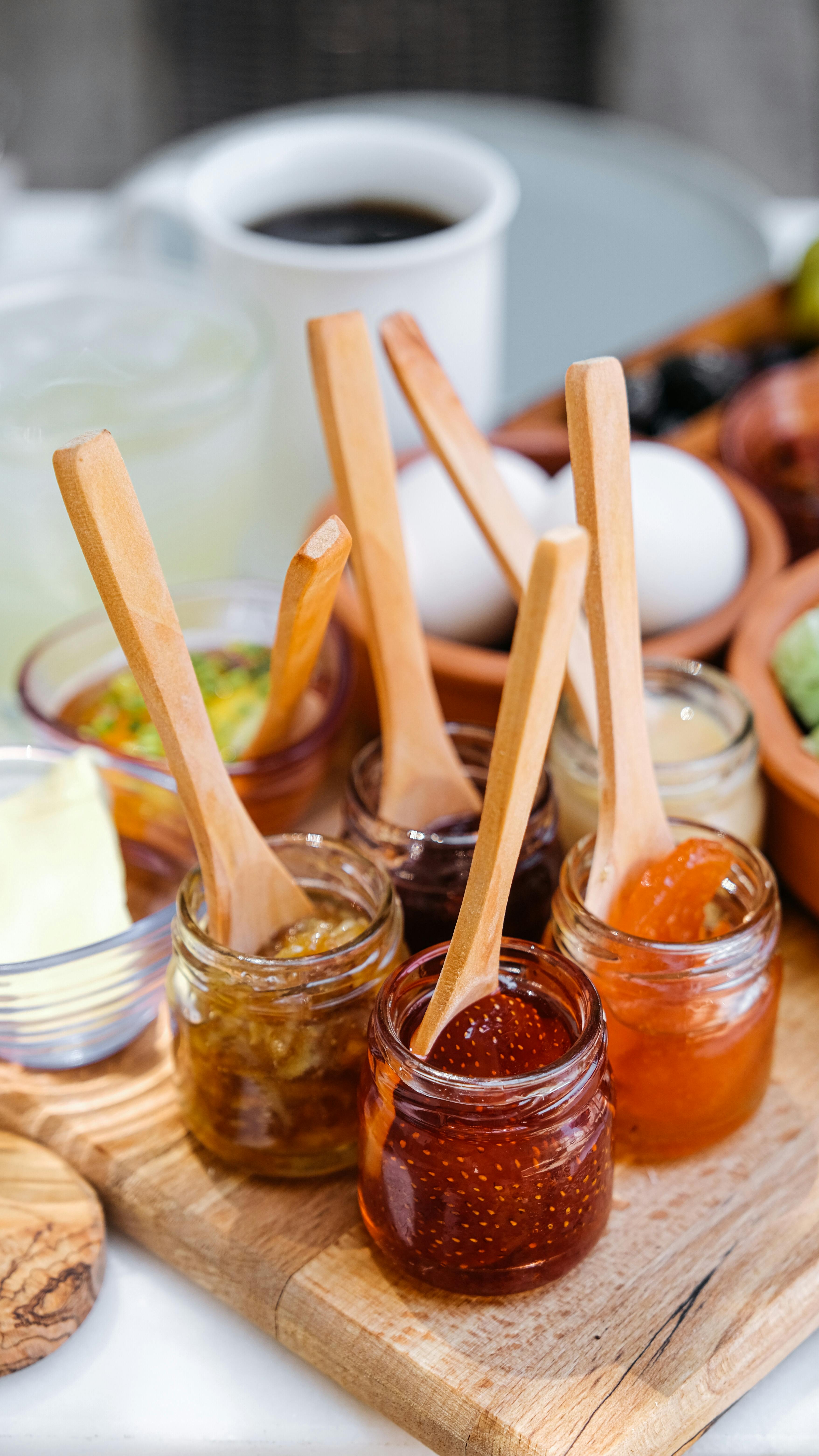 Glass Jars with Jams on Table · Free Stock Photo