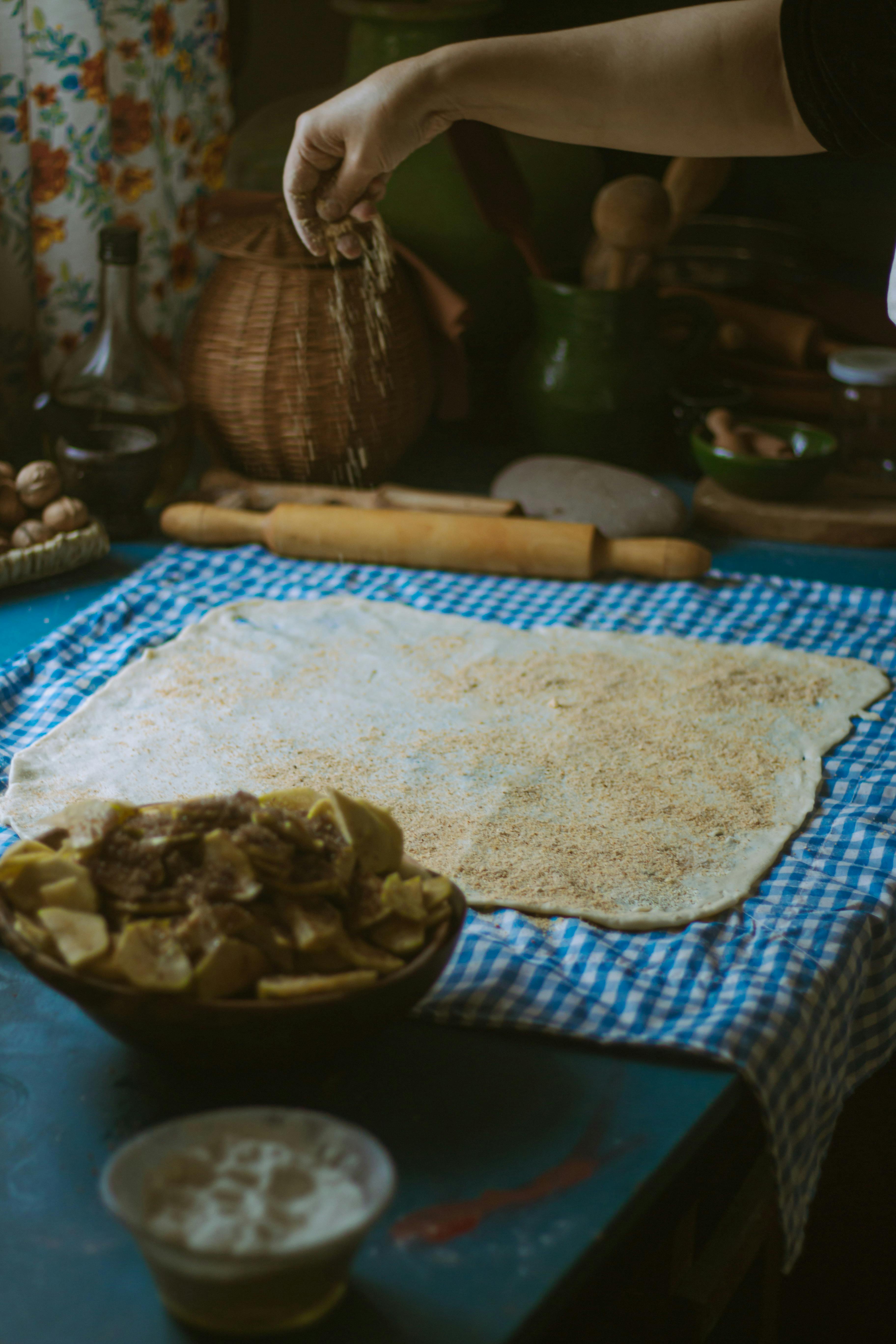 Man Working with Automatic Rolling Pin · Free Stock Photo