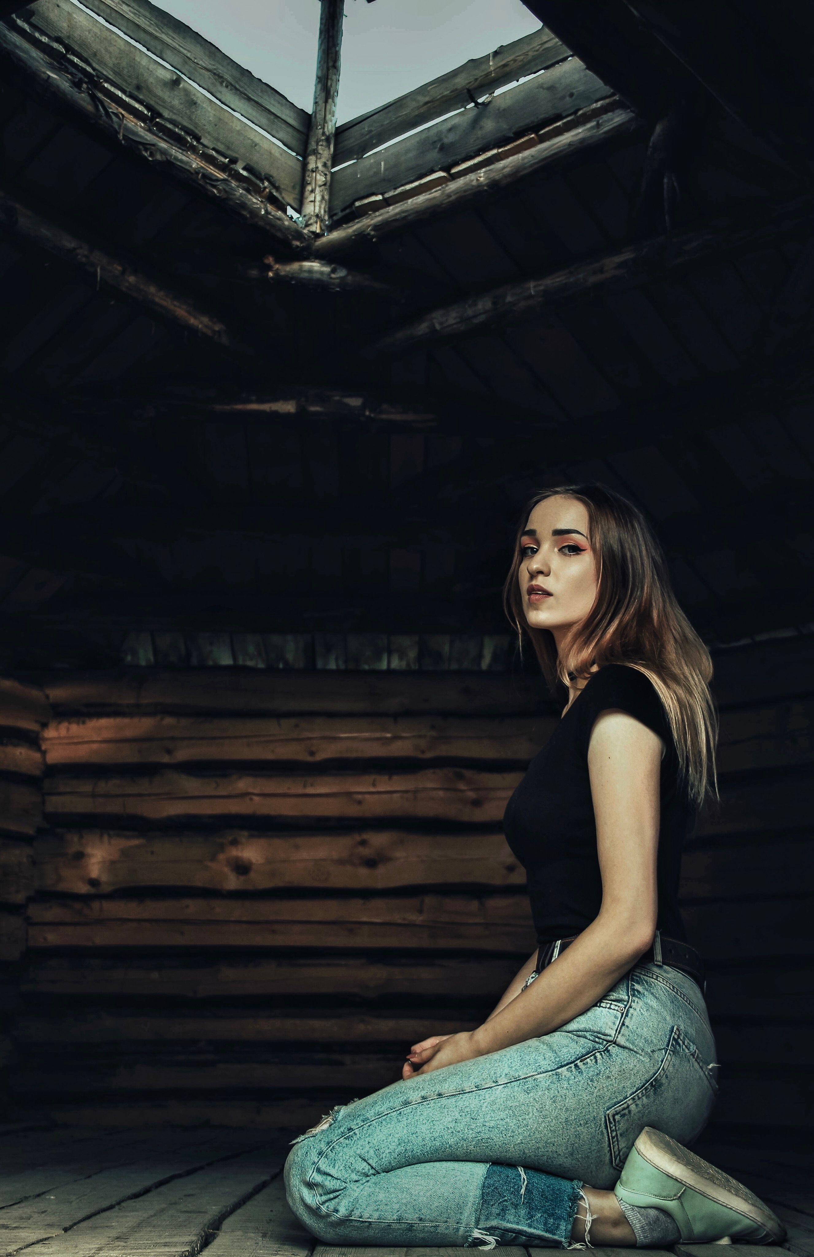 Beautiful Young Woman Sitting on Heels · Free Stock Photo