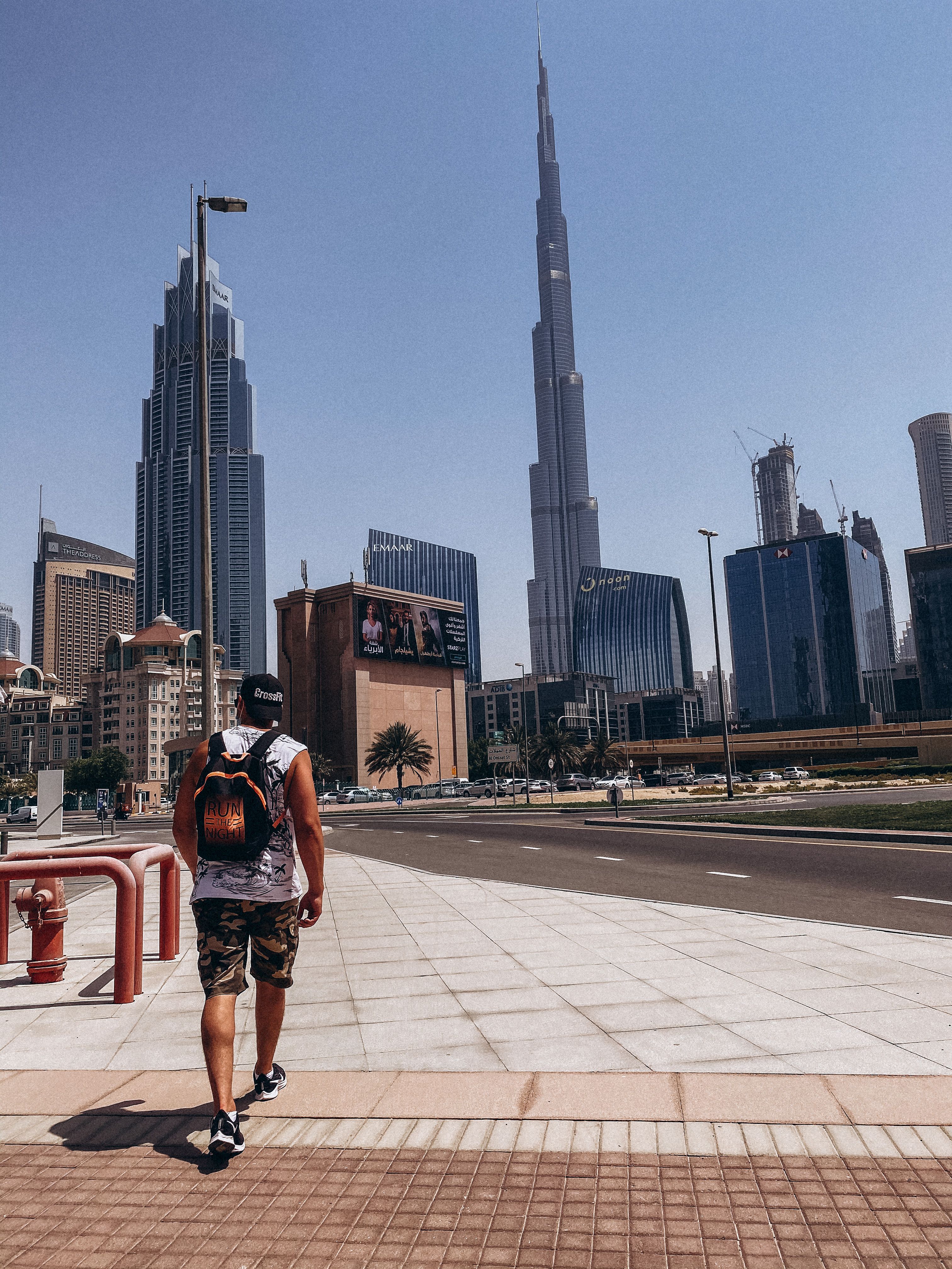 Back View of a Man Walking in the City · Free Stock Photo