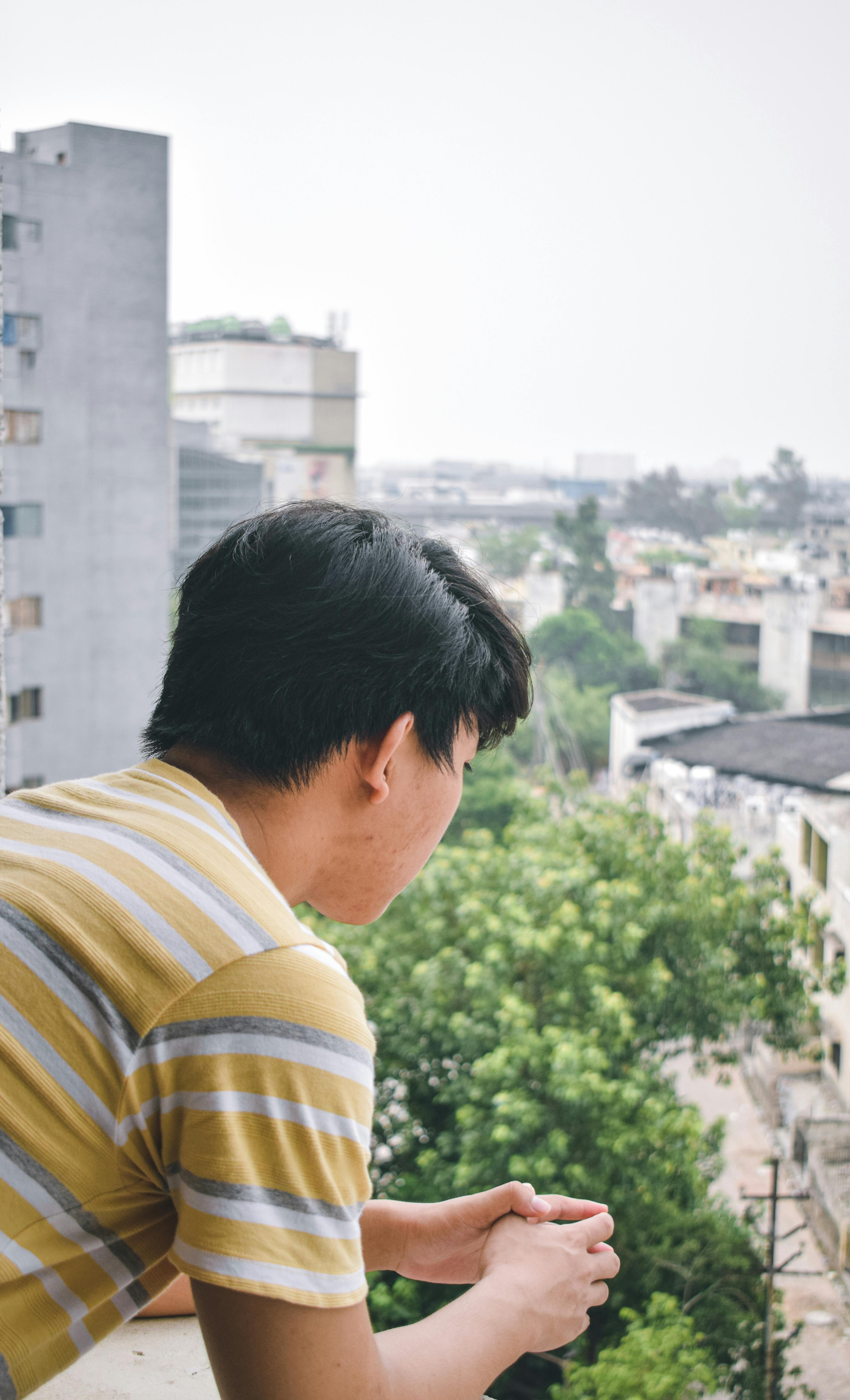 Man Standing Near Building · Free Stock Photo