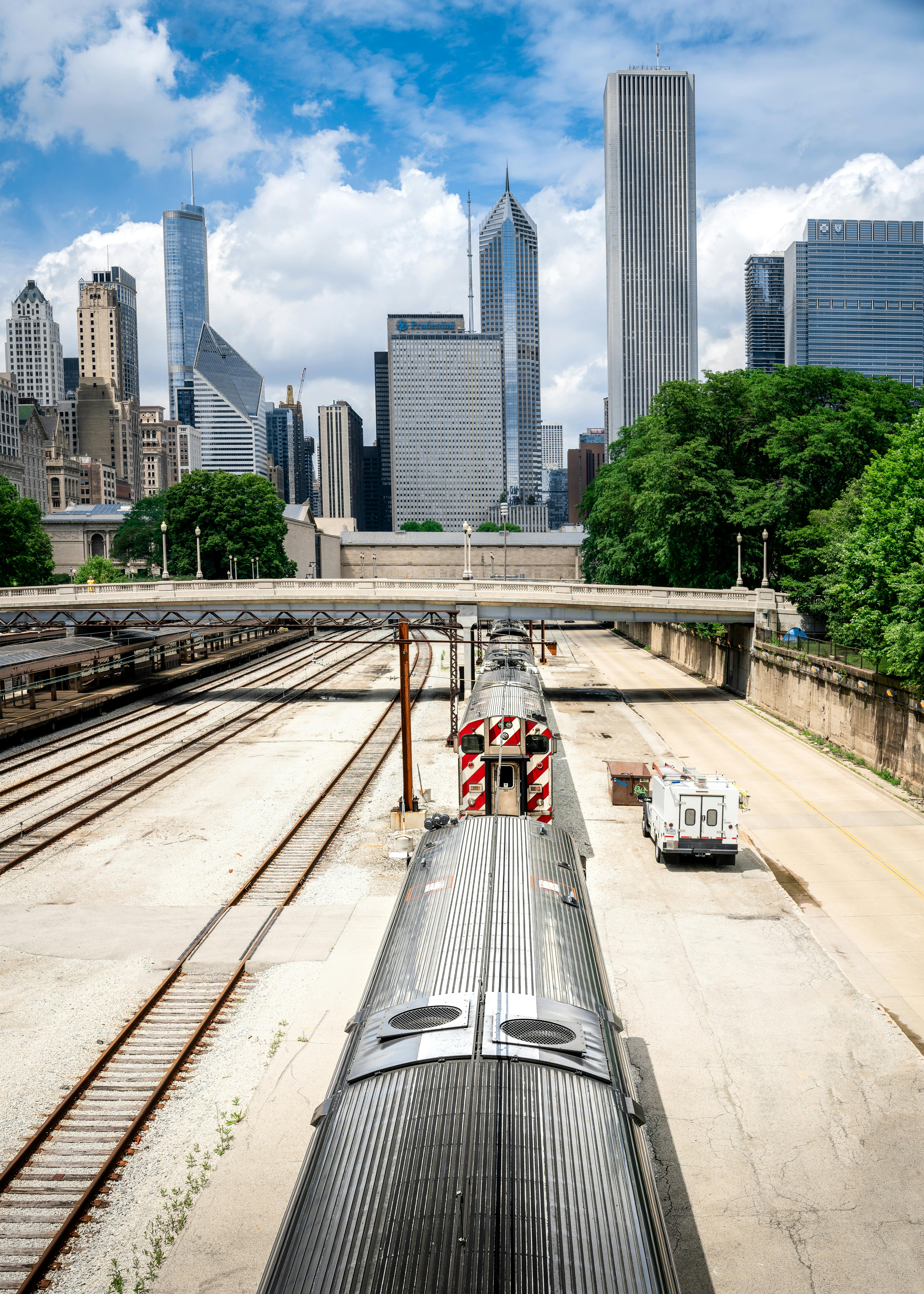 Train Wagons and City Skyscrapers behind · Free Stock Photo