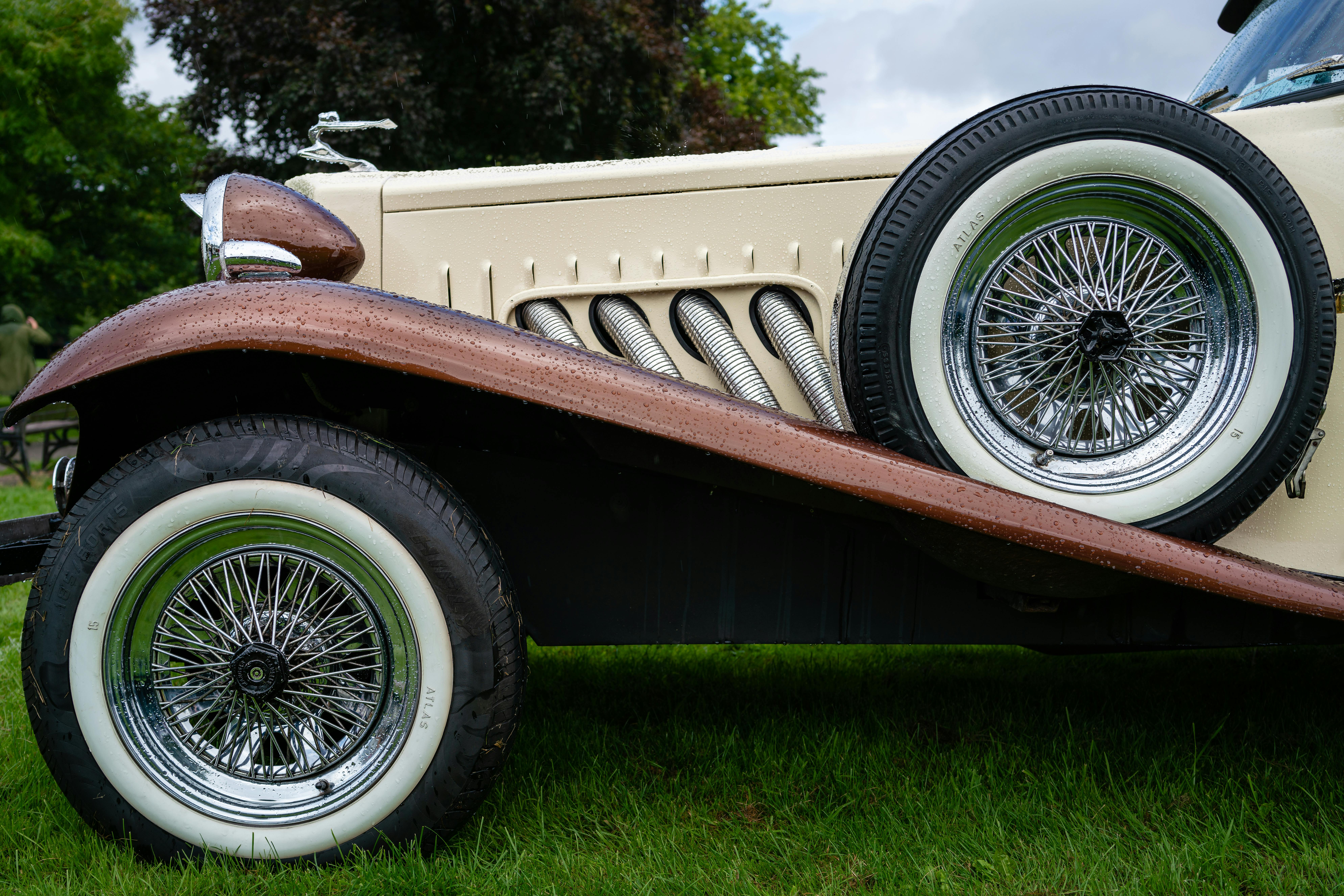 Side View of a Classic Car with Wheels · Free Stock Photo