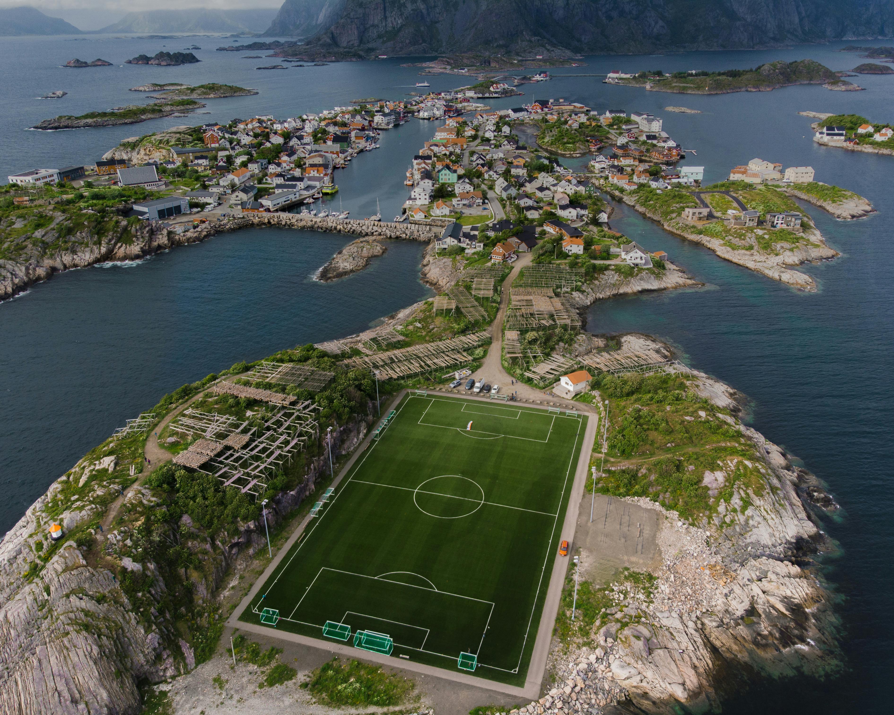Green Soccer Field in the Middle of an Island · Free Stock Photo