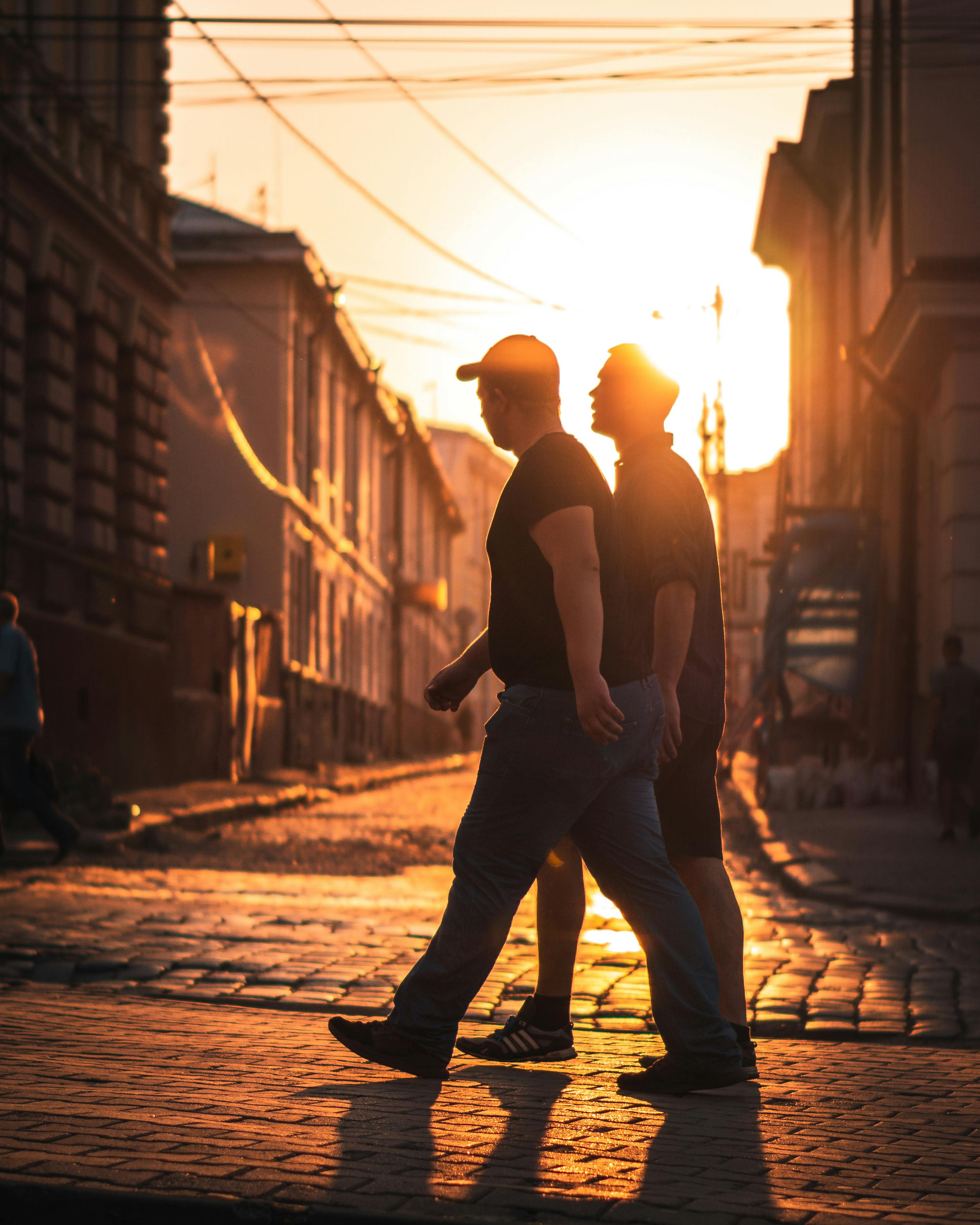 Men Walking Together on the Street · Free Stock Photo