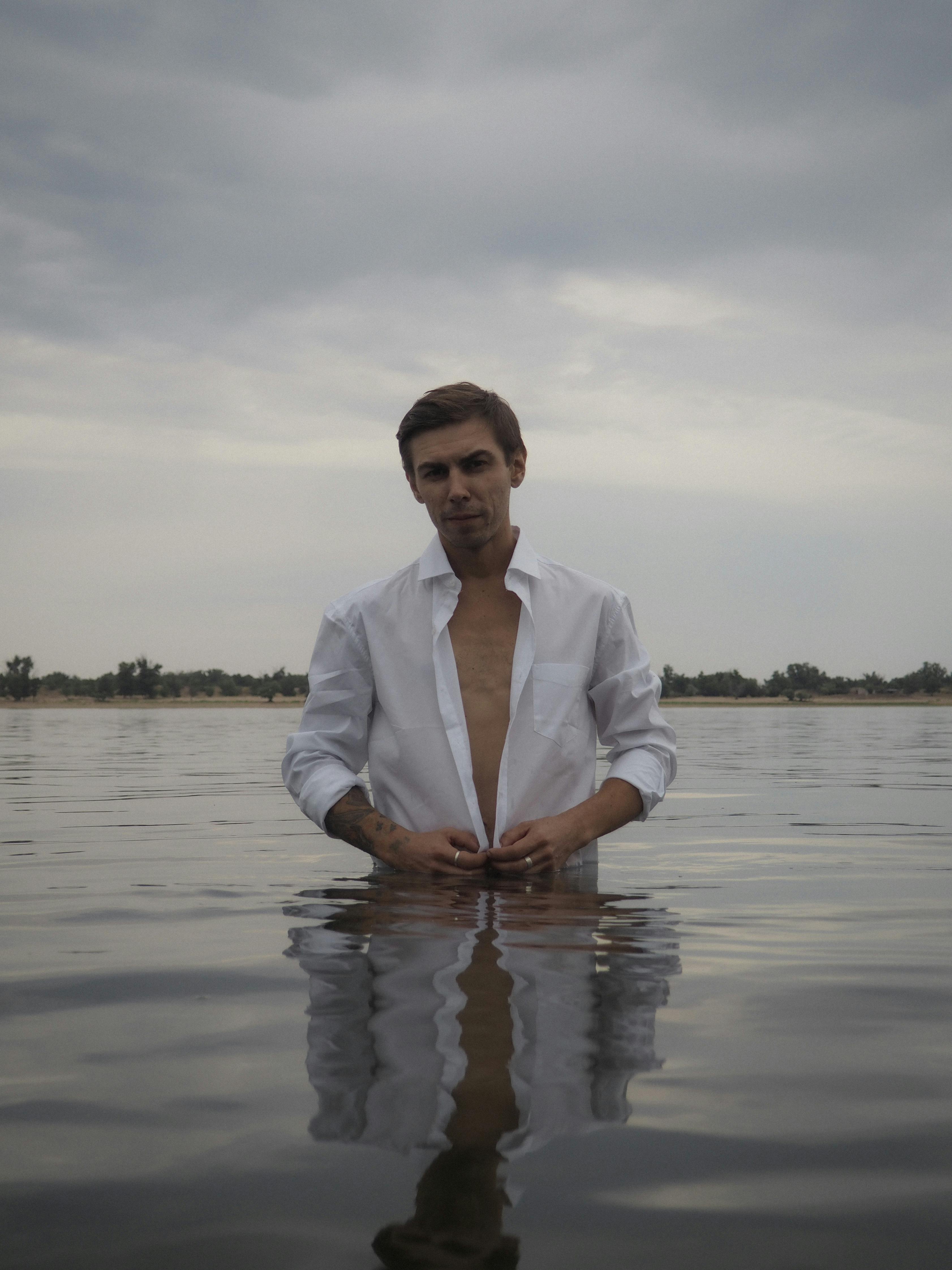 Two Men Posing in Stylish Shirts · Free Stock Photo