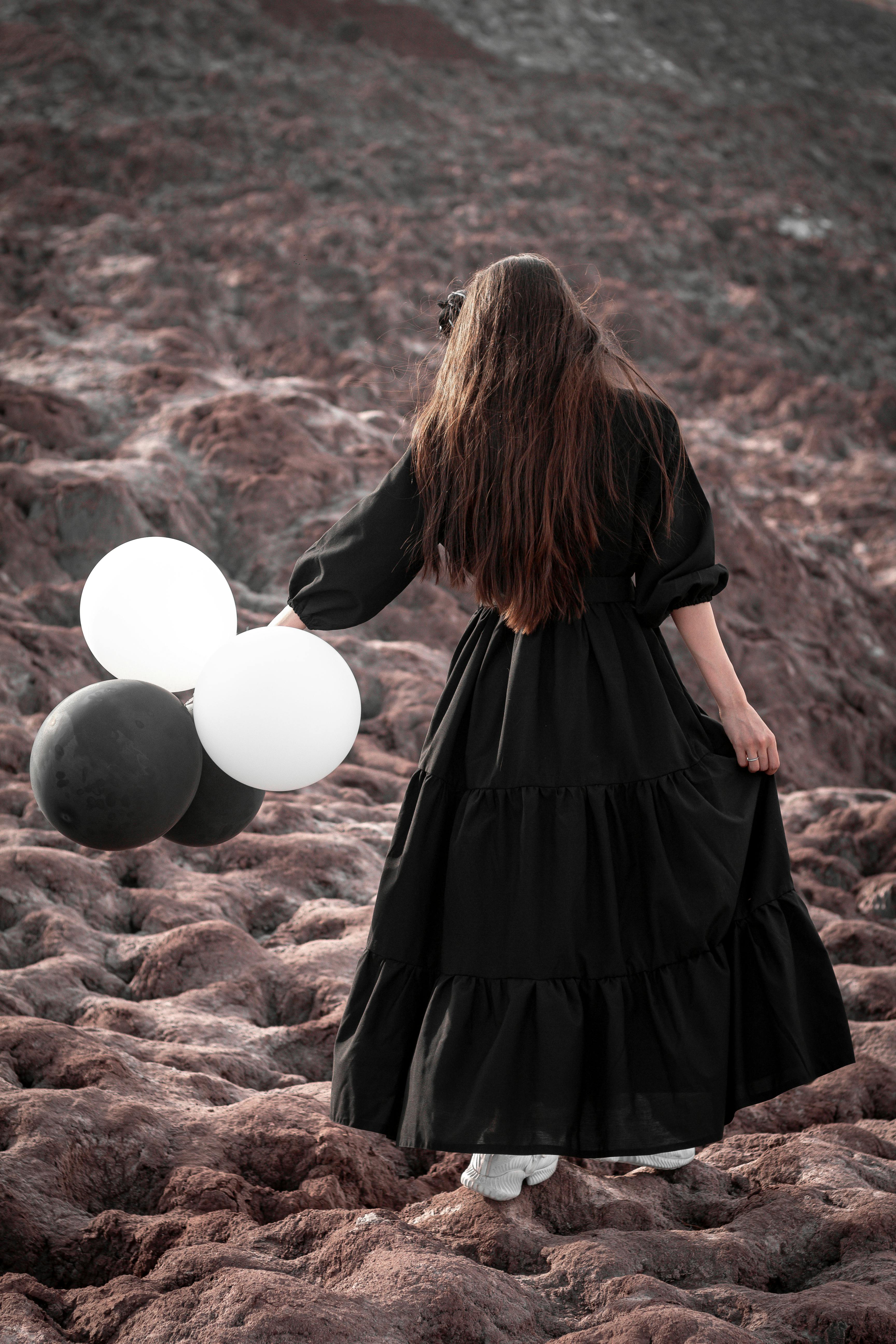 Silhouette of a Woman Standing on the Threshold · Free Stock Photo