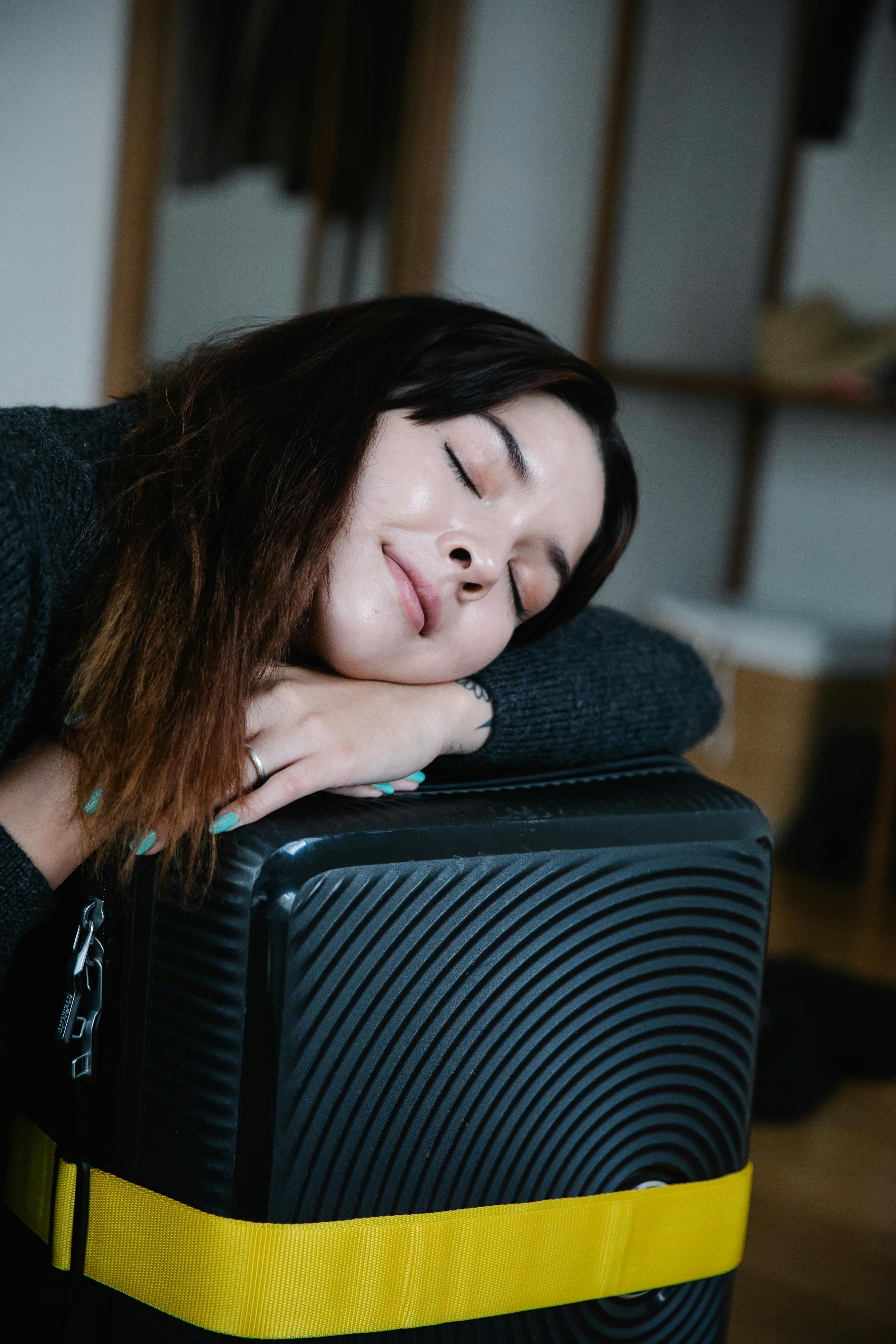 Happy Woman Hugging Suitcase · Free Stock Photo