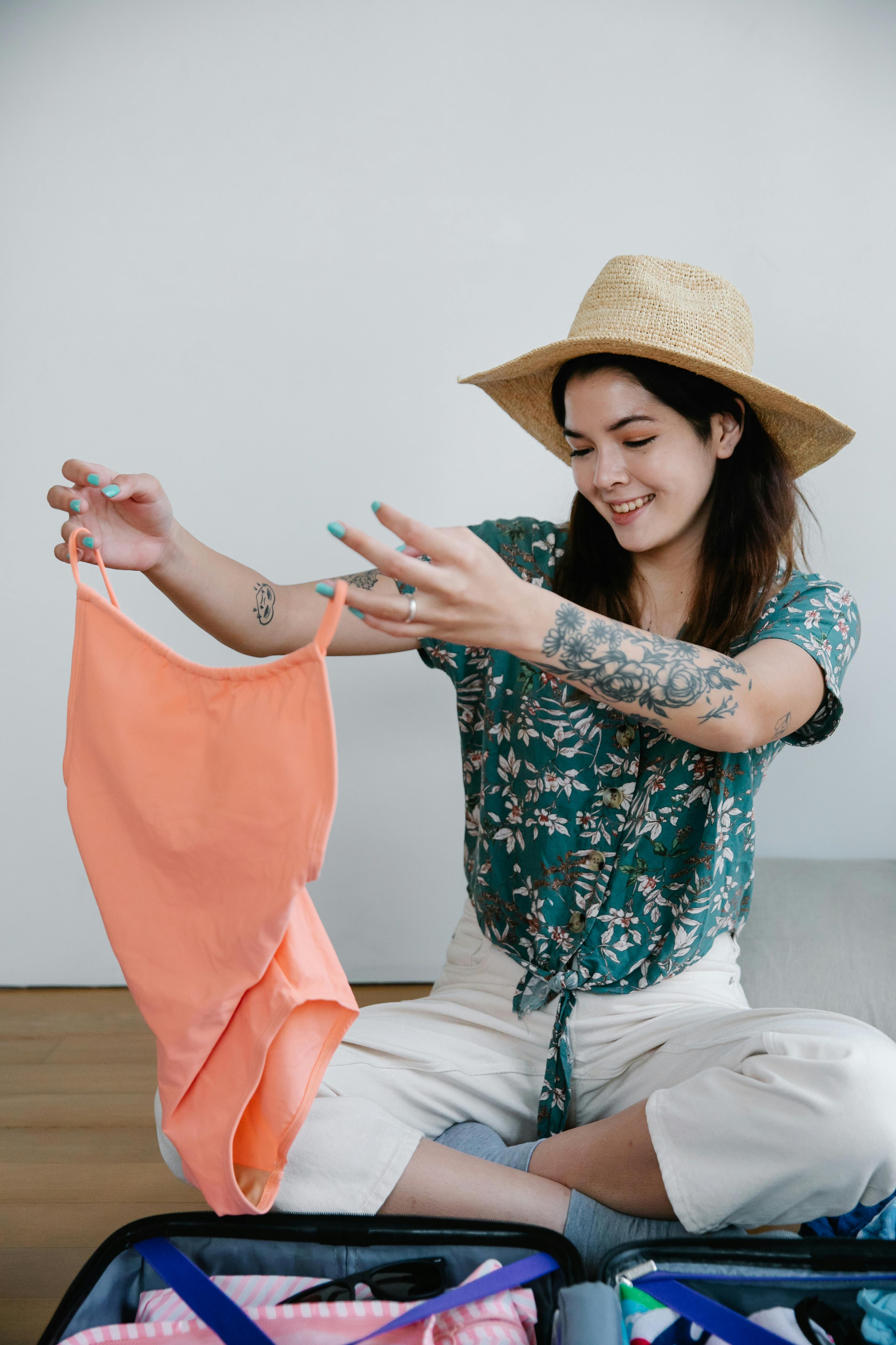 A Woman Packing Up Her Things · Free Stock Photo