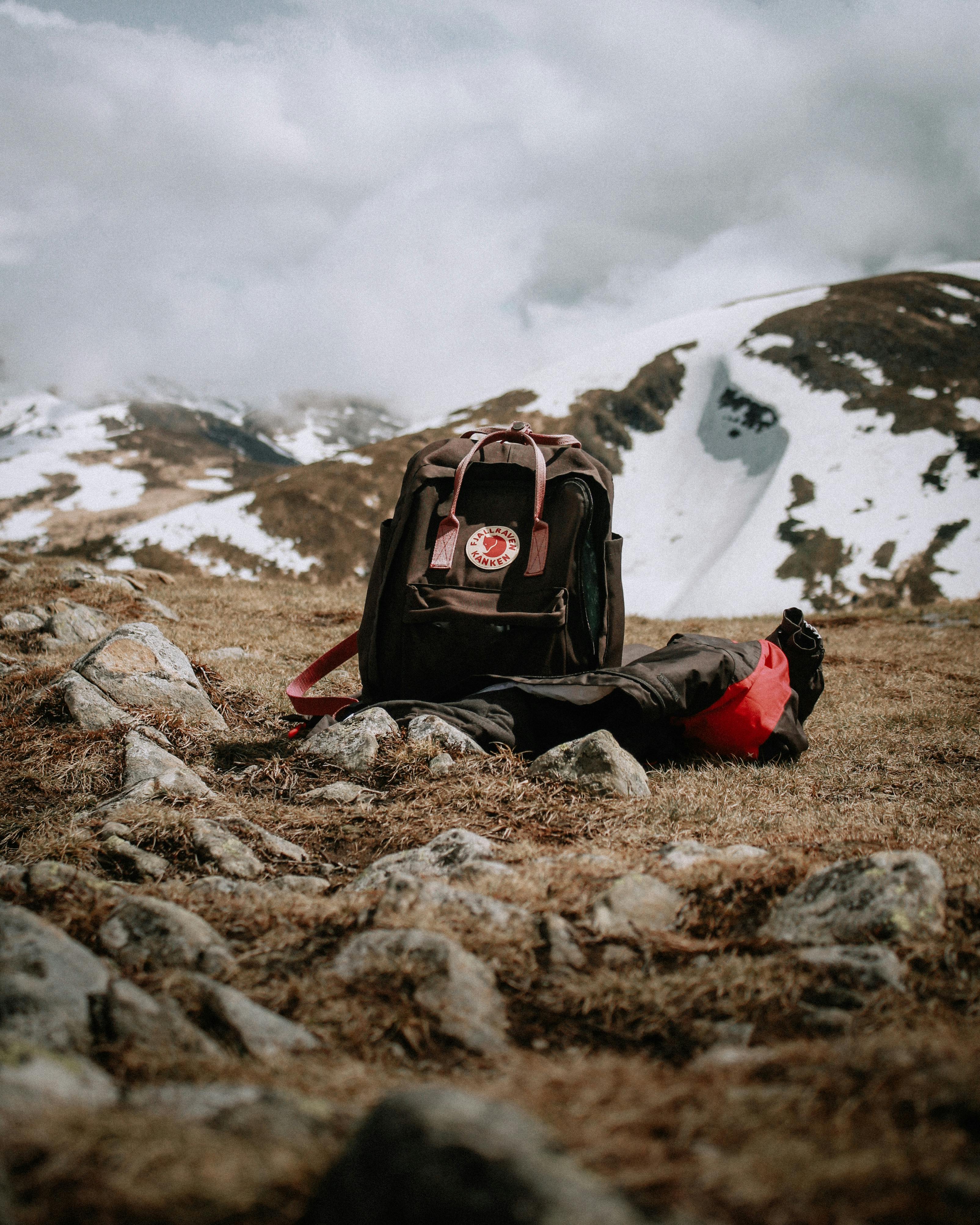 Backpack on the Ground in Mountains · Free Stock Photo