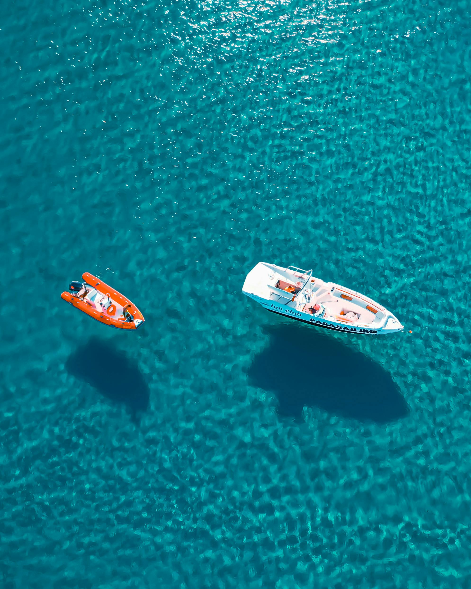 Top View Photo of Boats on Sea · Free Stock Photo