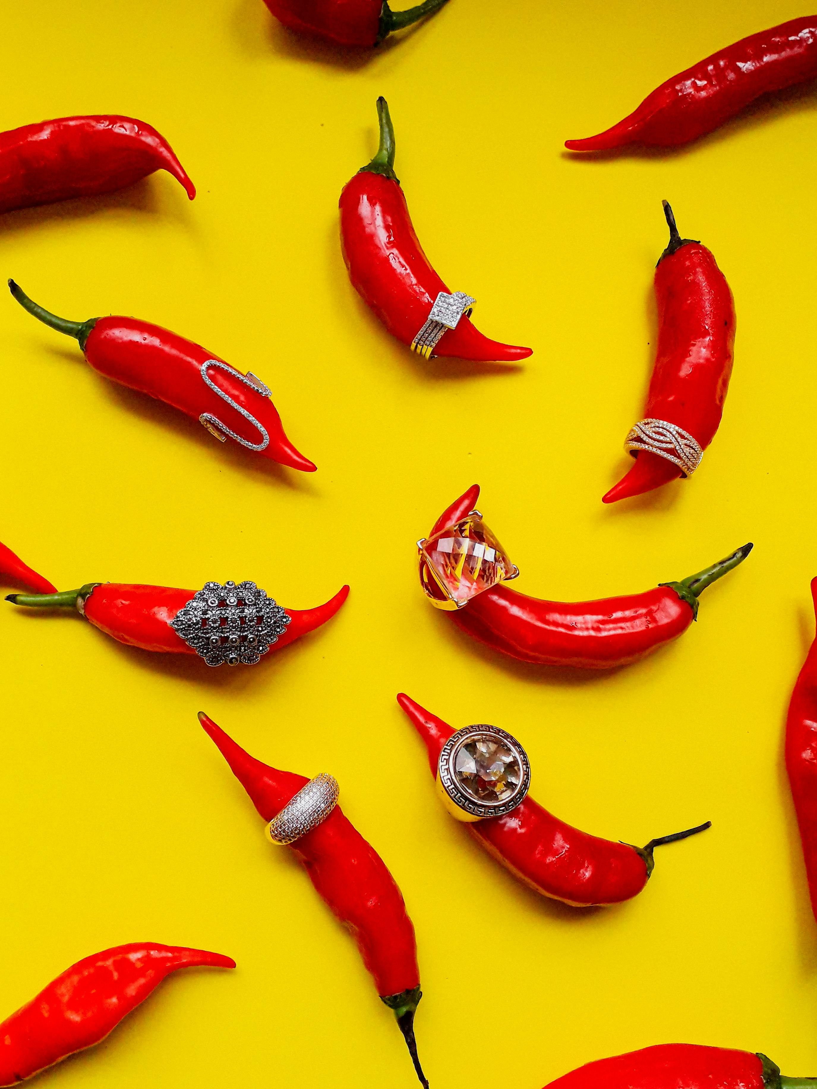 Red Chili Peppers with Jewelry Rings · Free Stock Photo