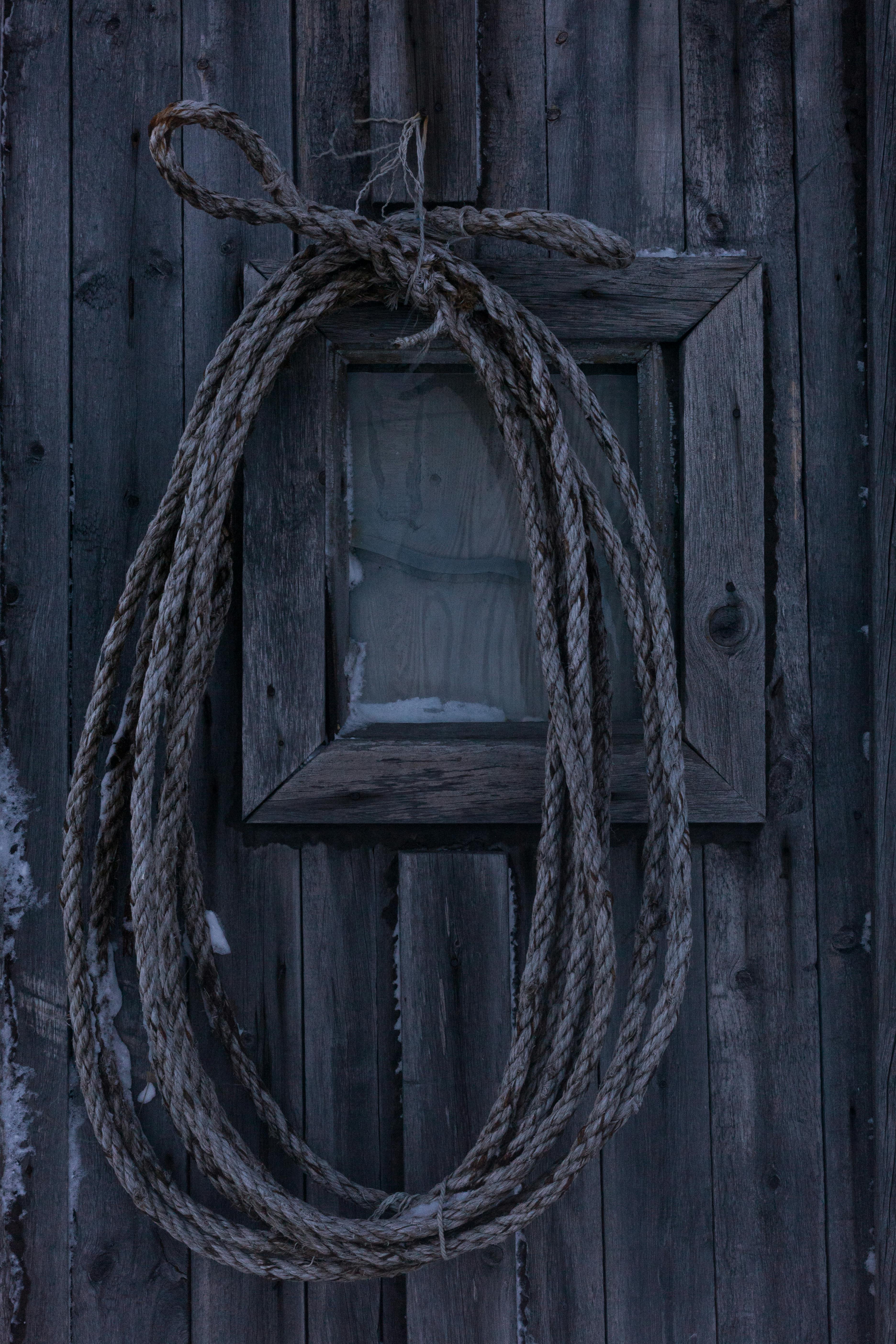 Rope Hanging on an Old Barn · Free Stock Photo