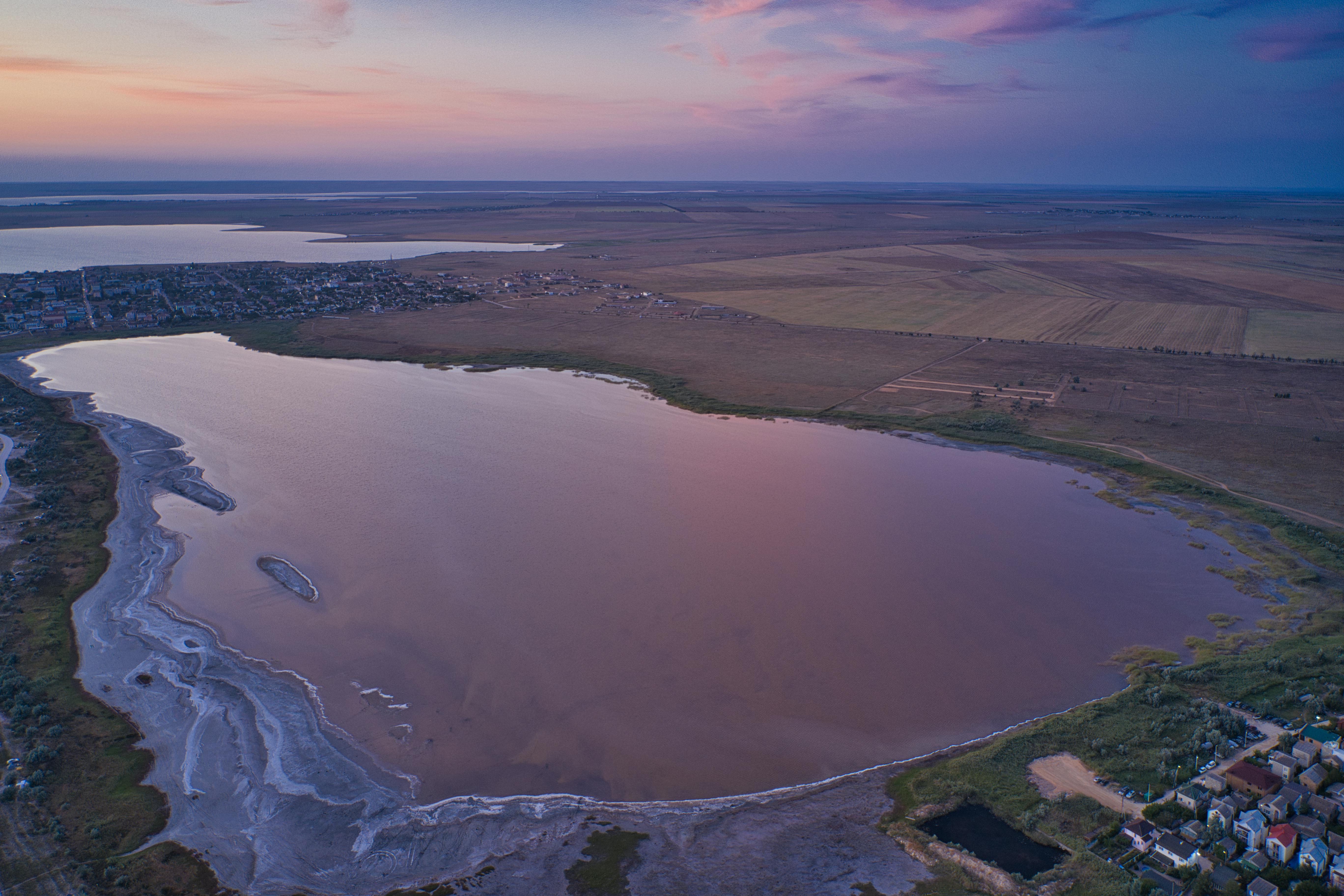Aerial View of Lakes in Fields at Sunrise · Free Stock Photo