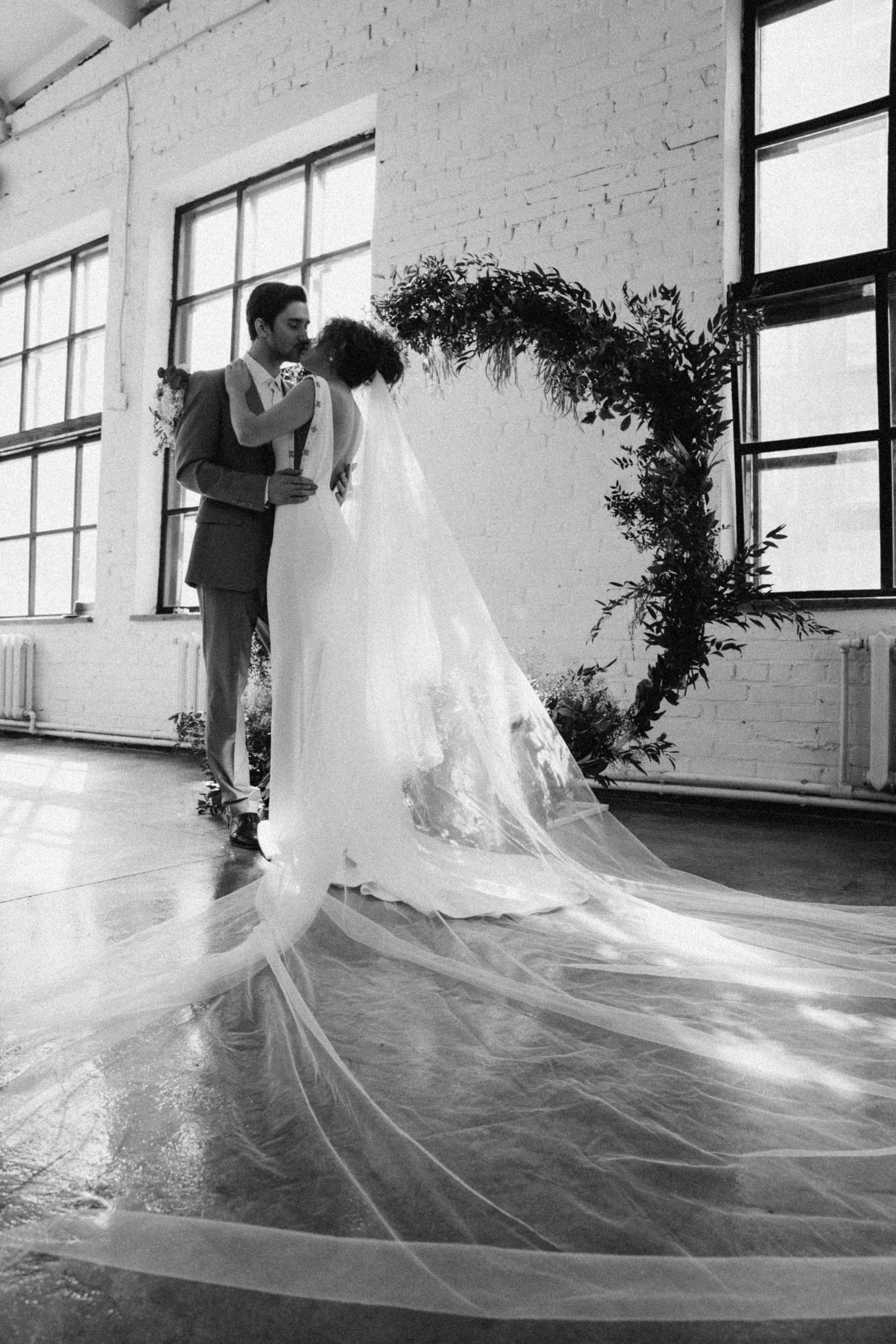 Grayscale Photo of Married Couple Kissing · Free Stock Photo