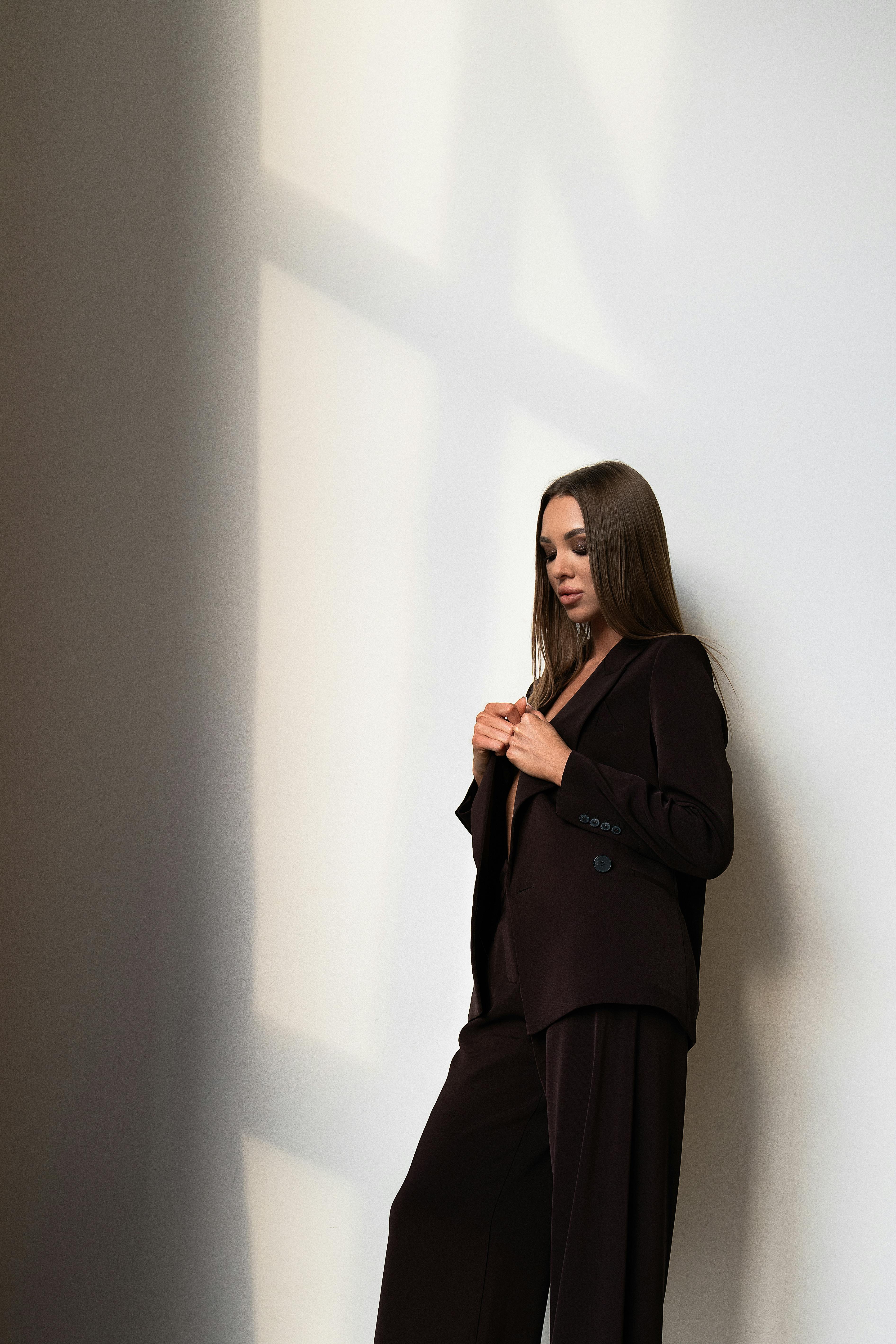 Beautiful Woman Wearing a Black Suit · Free Stock Photo