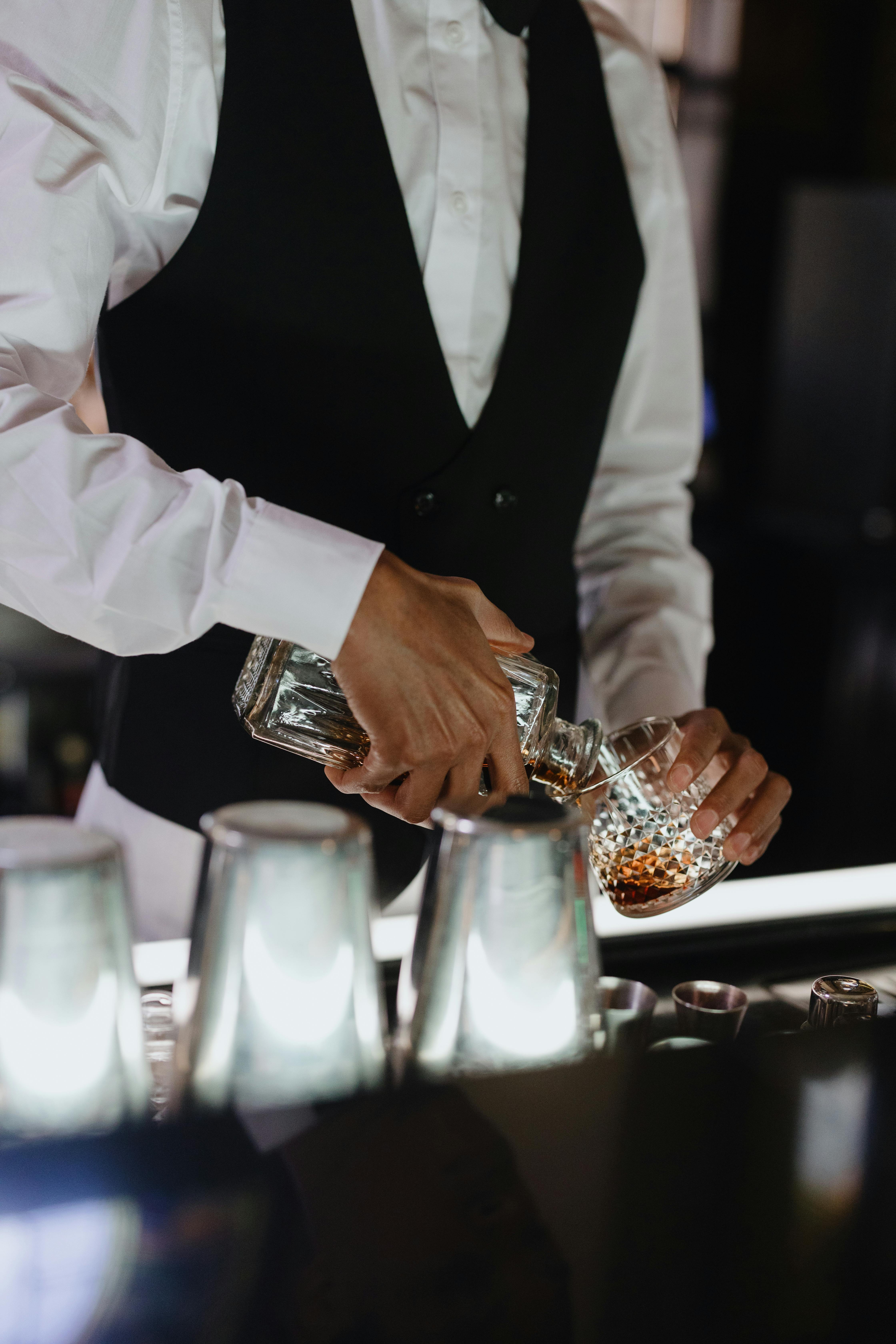 Bartender preparing Drinks for Customers · Free Stock Photo