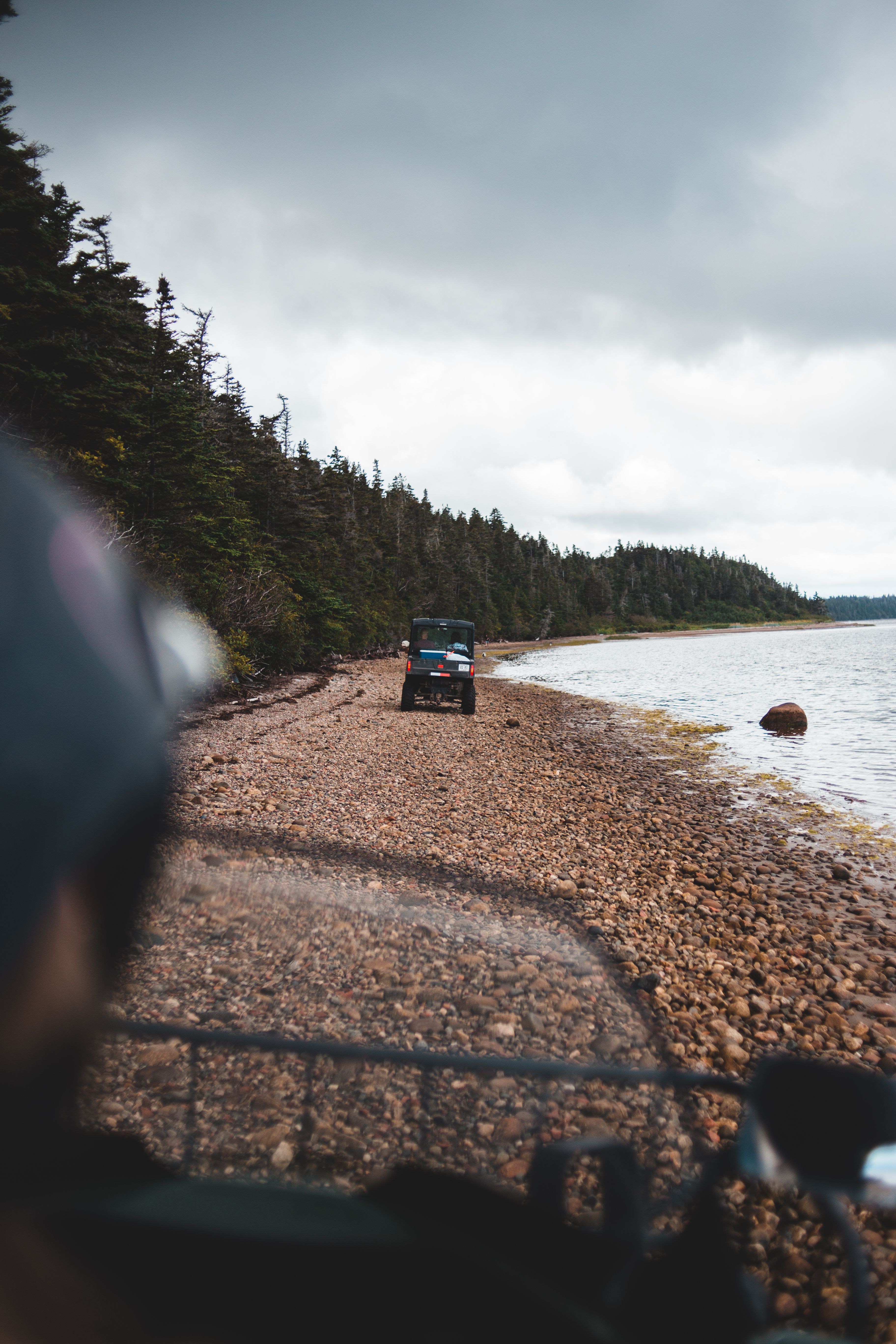 A Person Sitting Near the River · Free Stock Photo