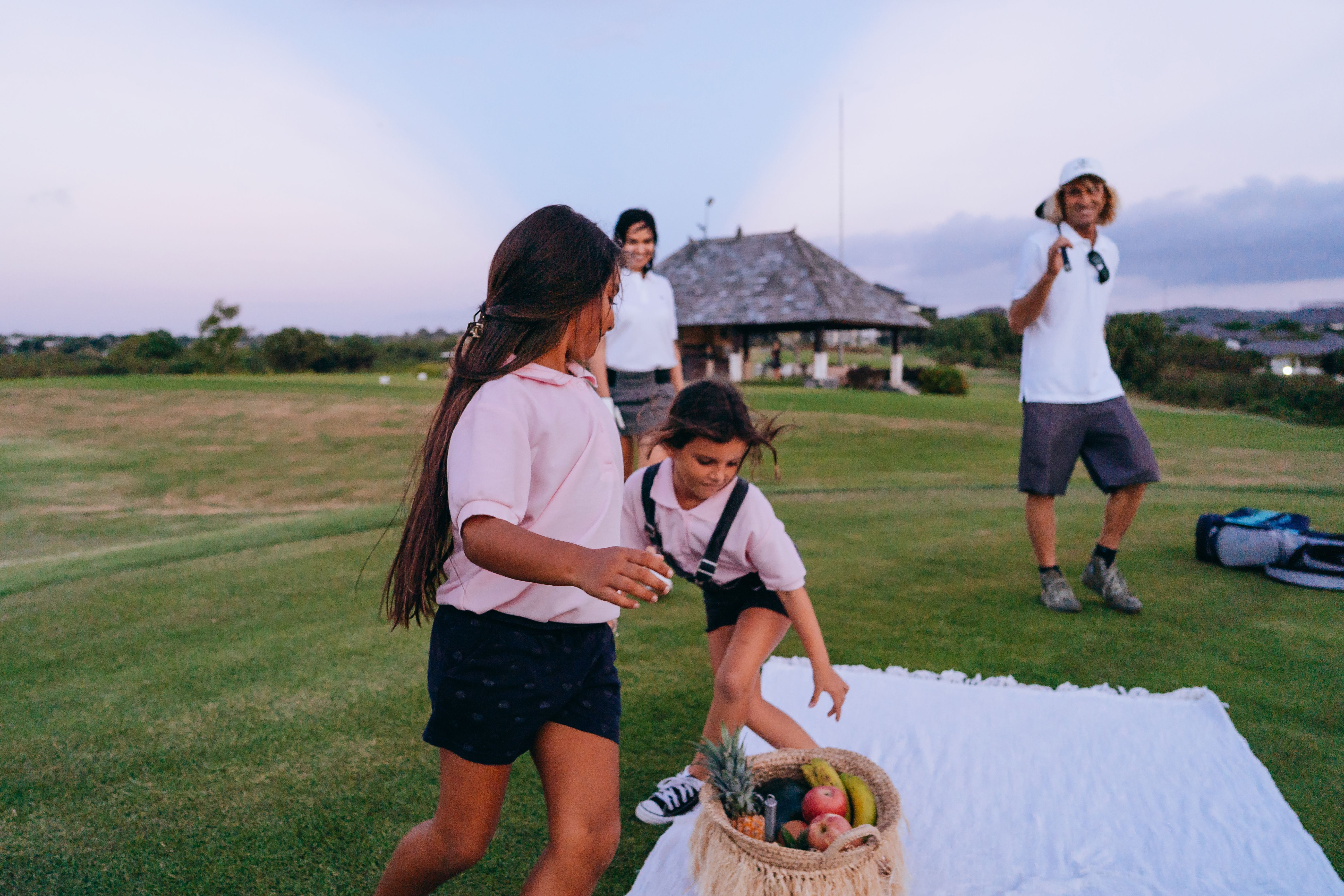 Family having Picnic on a Golf Course · Free Stock Photo