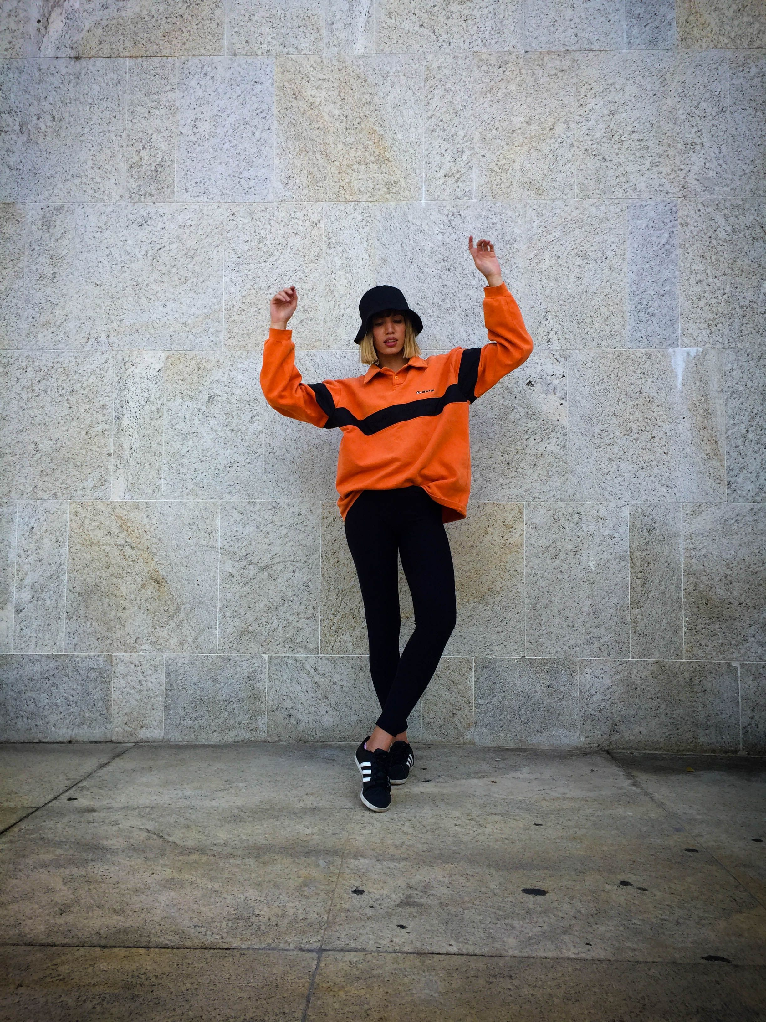 A Woman Posing with her Hands up · Free Stock Photo