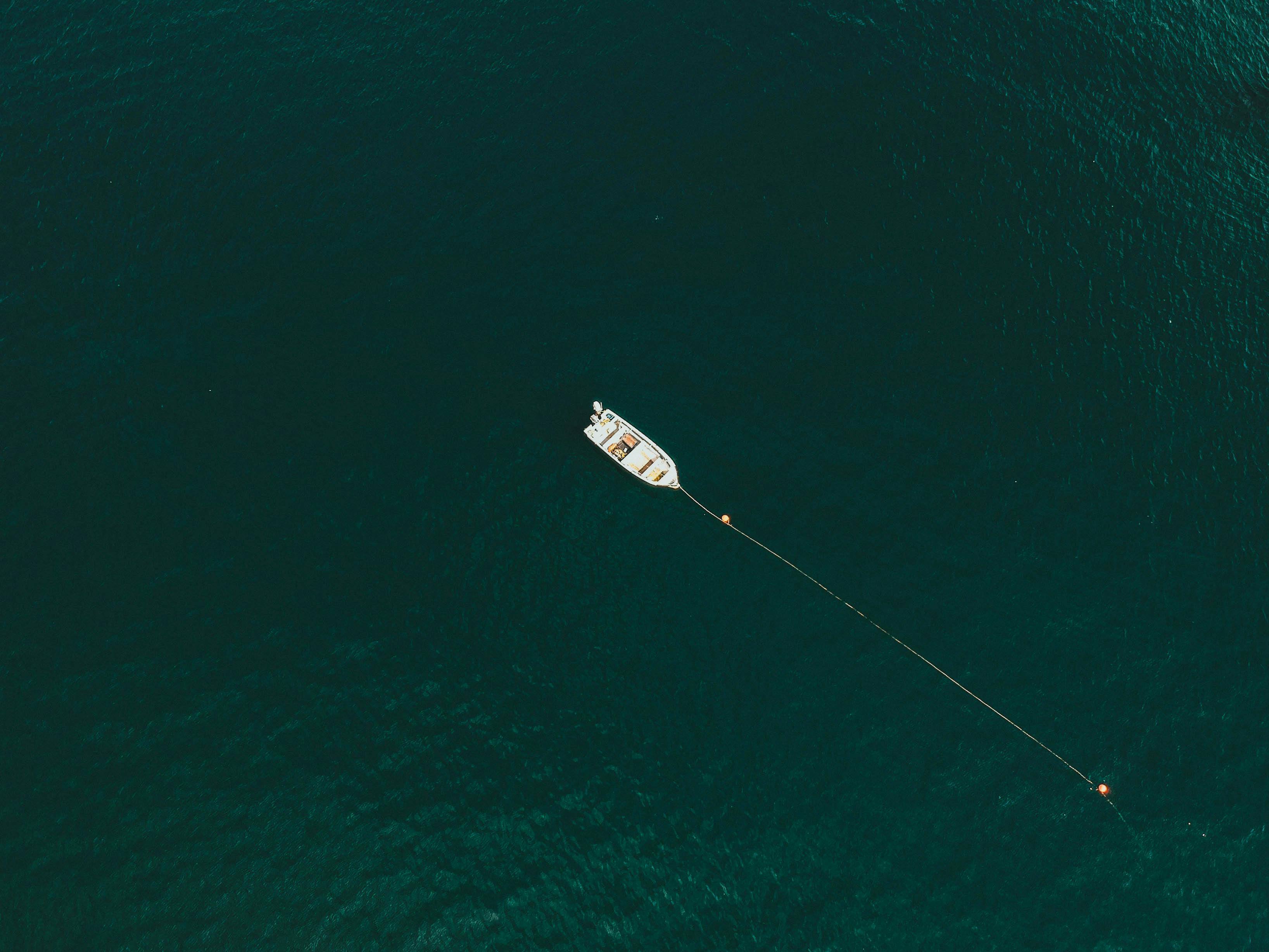 Person on Boat in Birds Eye View · Free Stock Photo