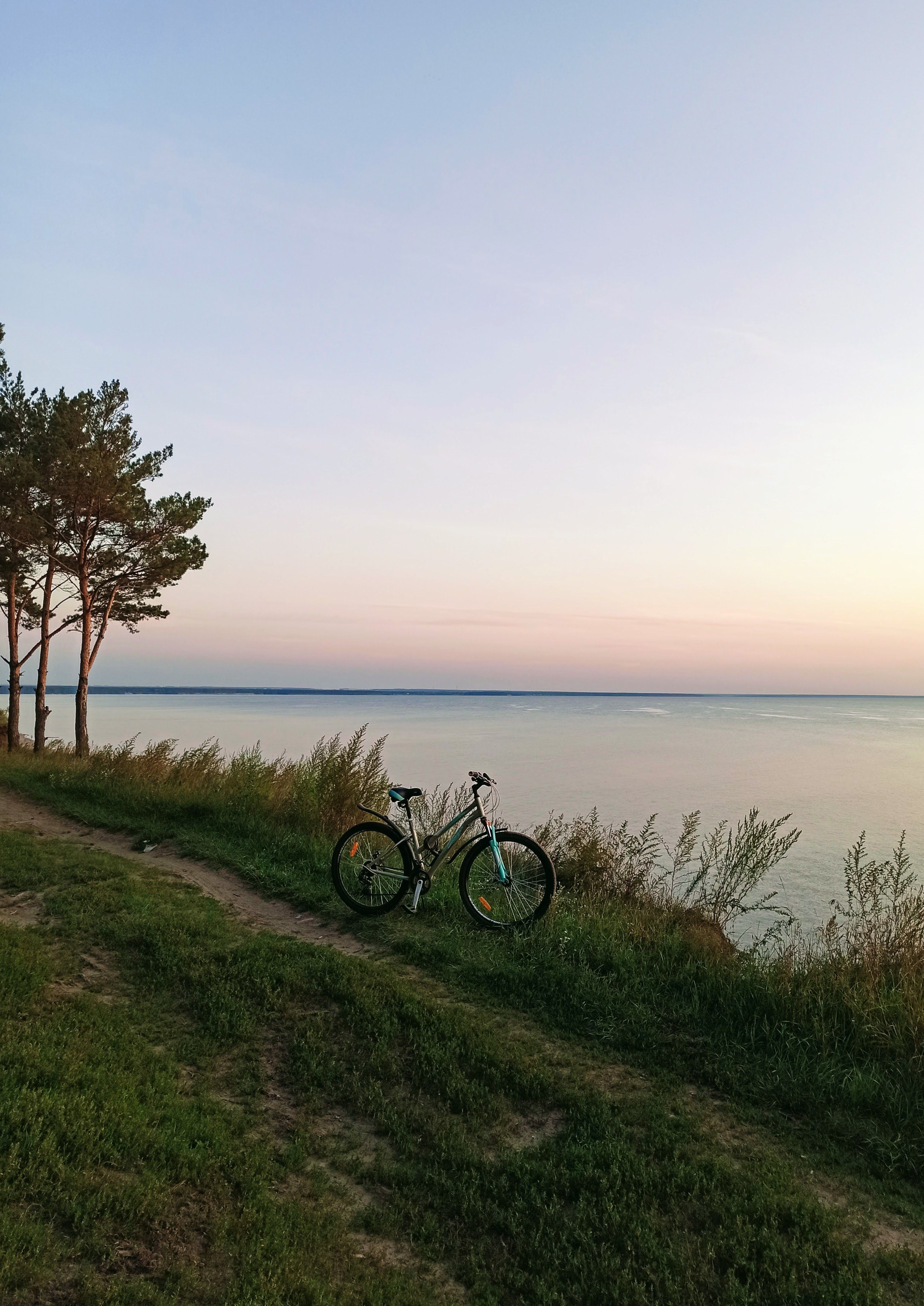 A Bicycle Parked on a Cliff · Free Stock Photo