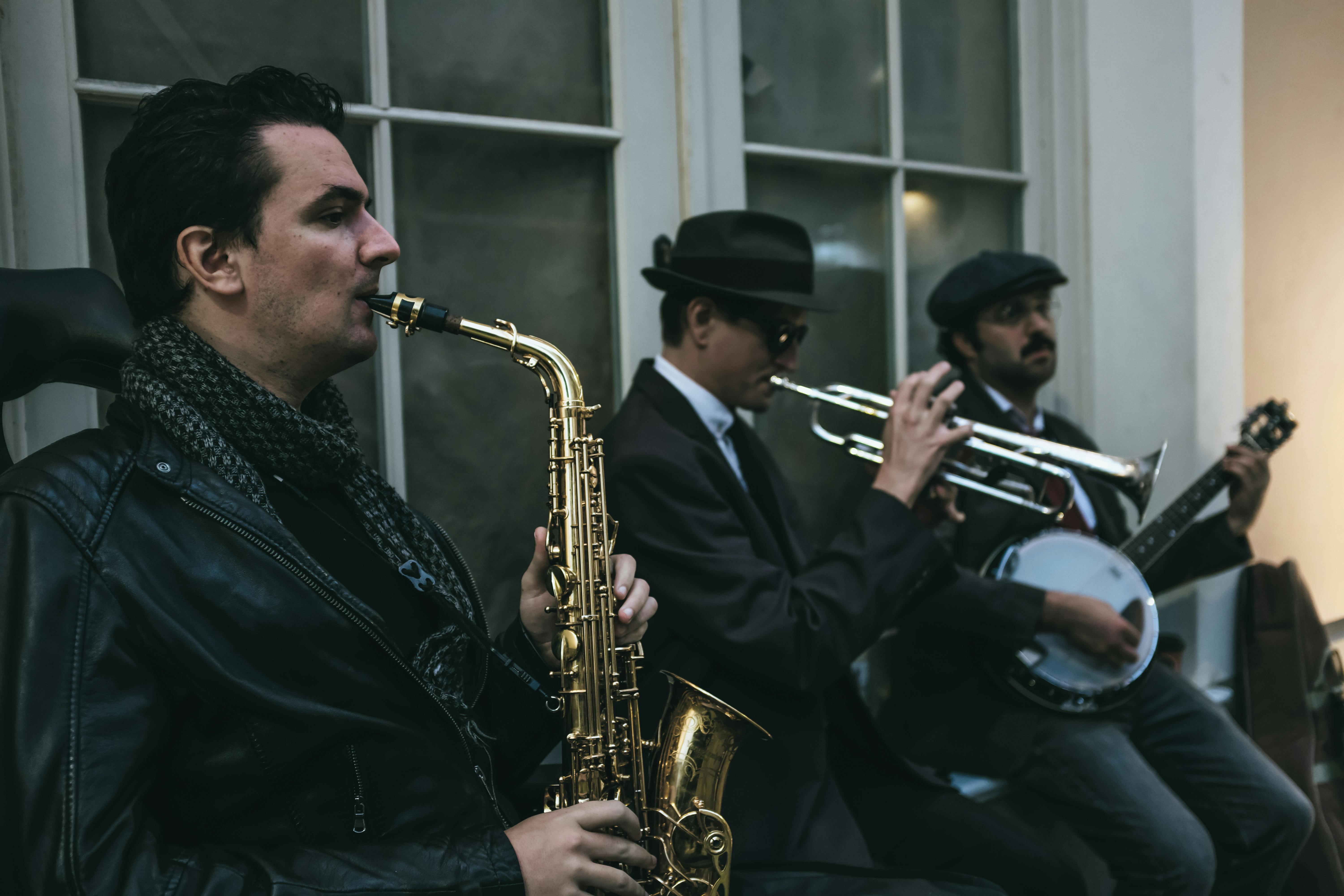 Man Playing Brass Instrument during Daytime · Free Stock Photo