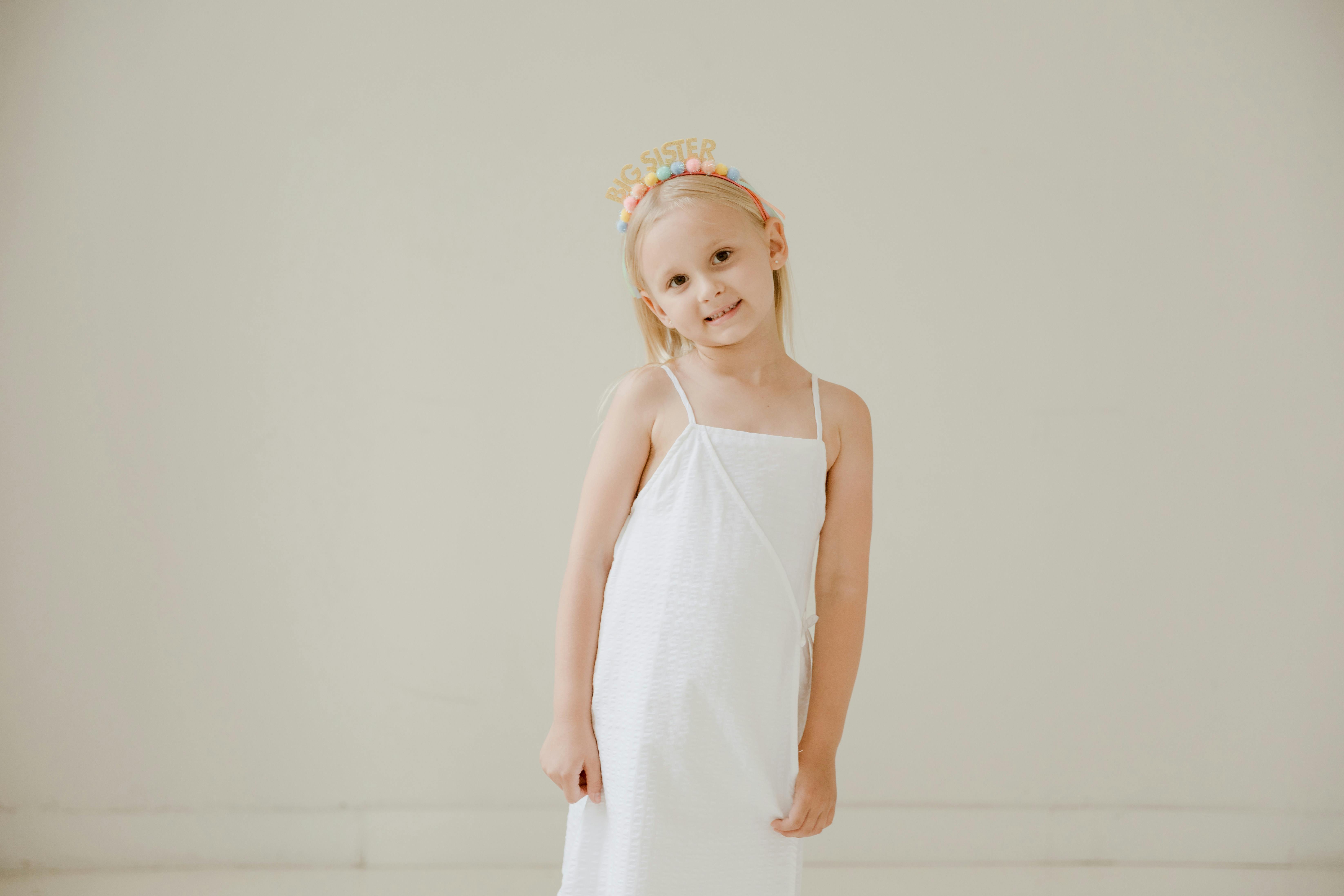 A Cute Young Girl wearing Dress · Free Stock Photo