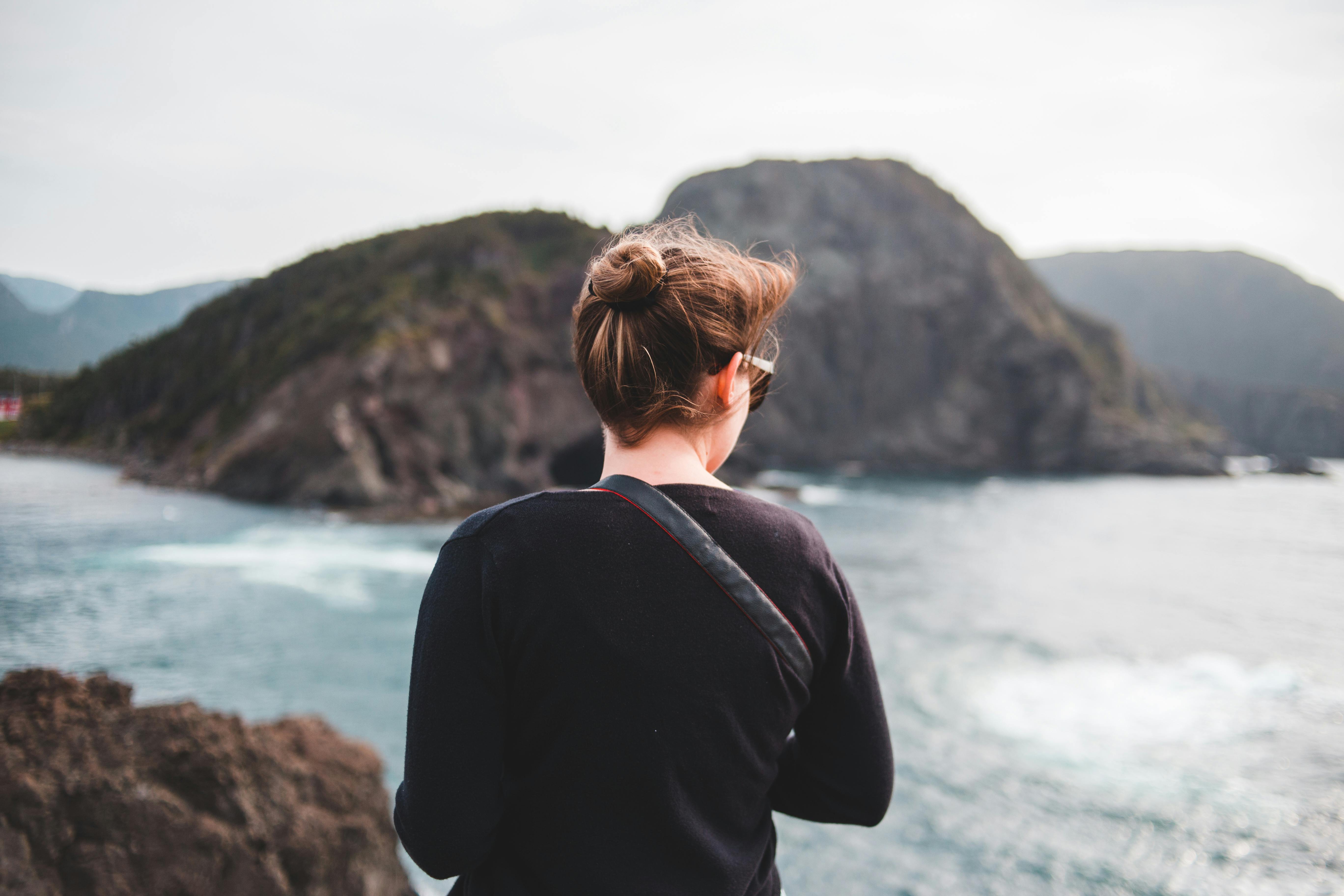 A Couple Wearing Trench Coats at the Beach · Free Stock Photo