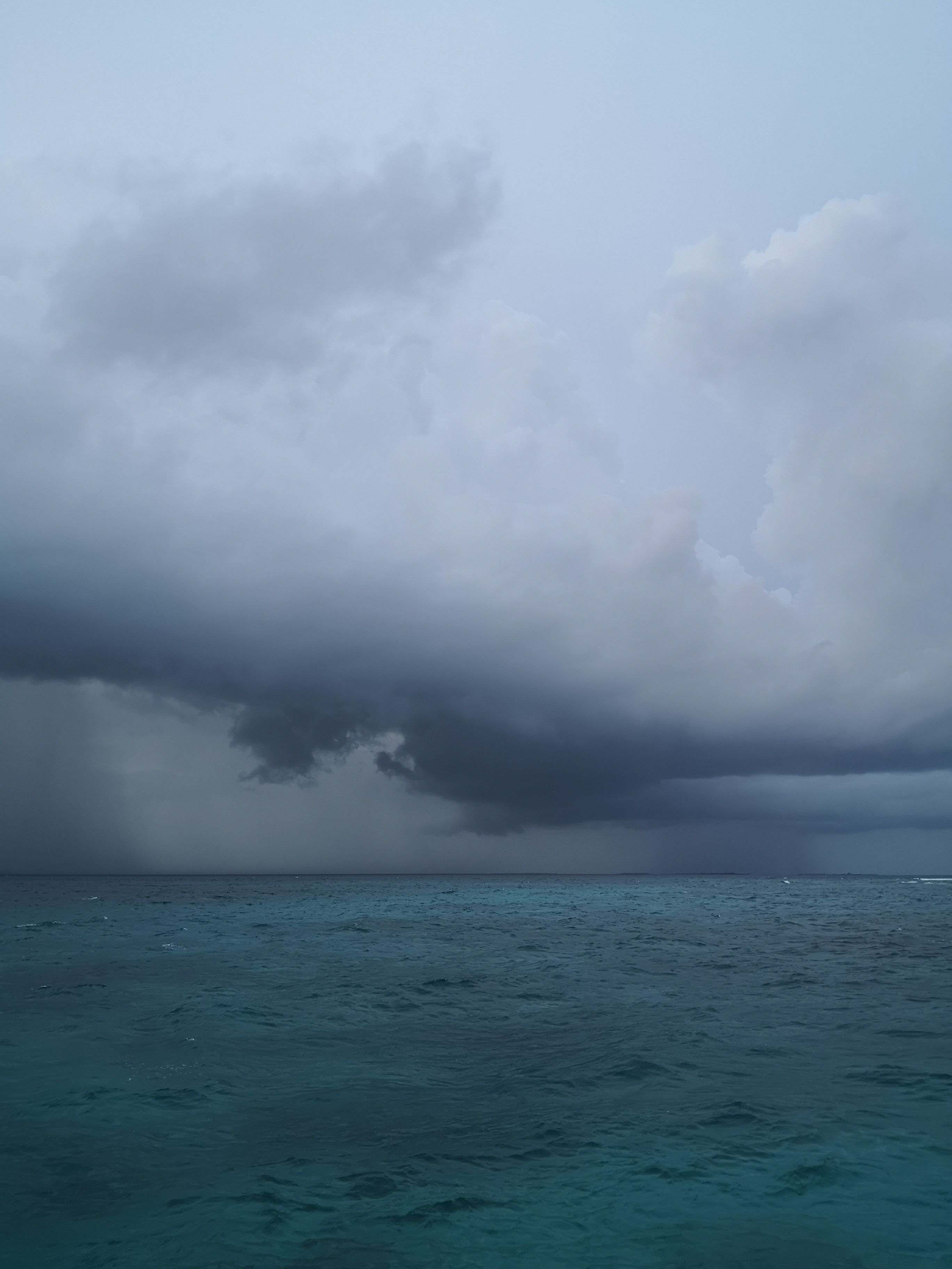 Body of Water Under Cloudy Sky · Free Stock Photo