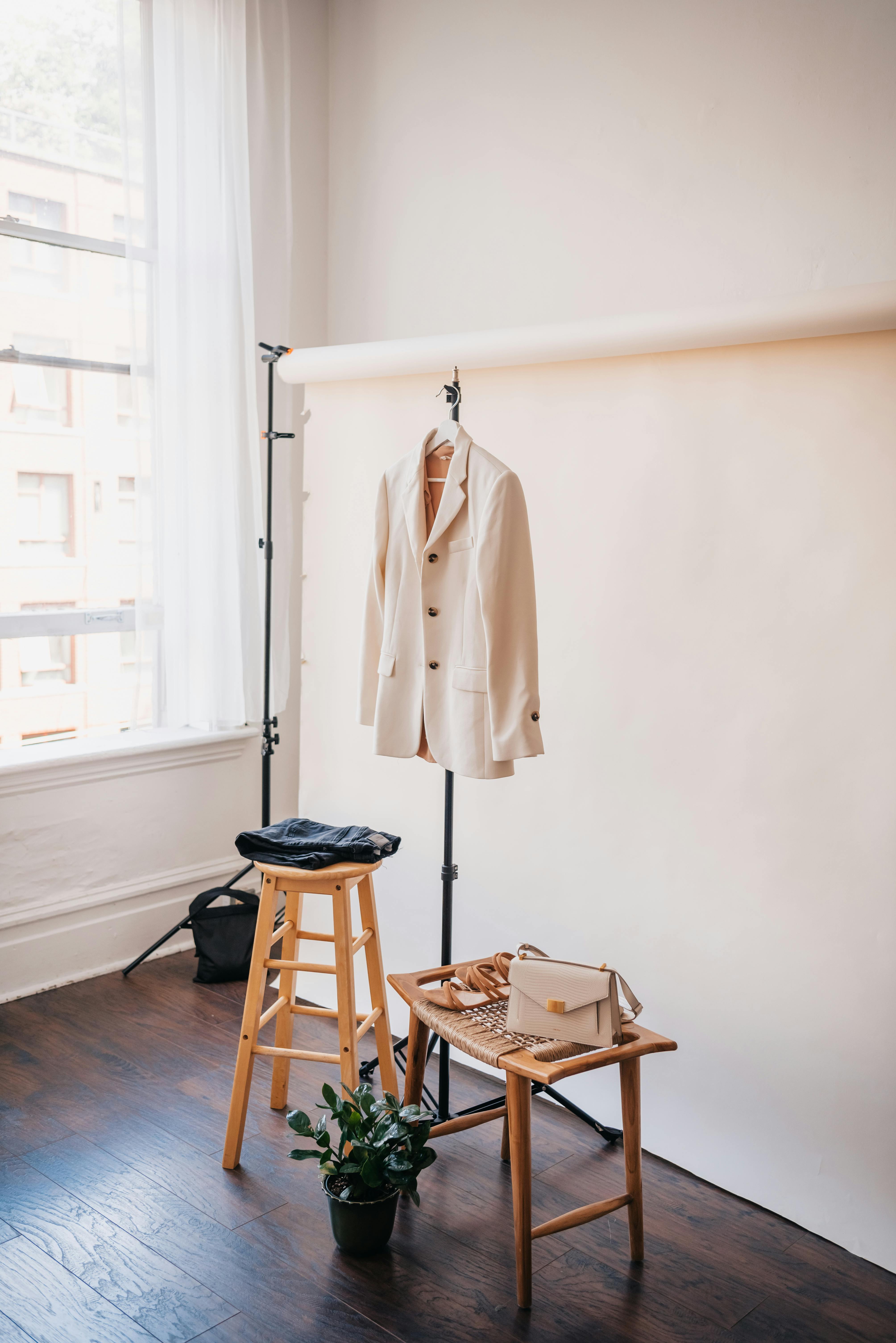 Brown Bag On Top Of Stool With Textiles · Free Stock Photo