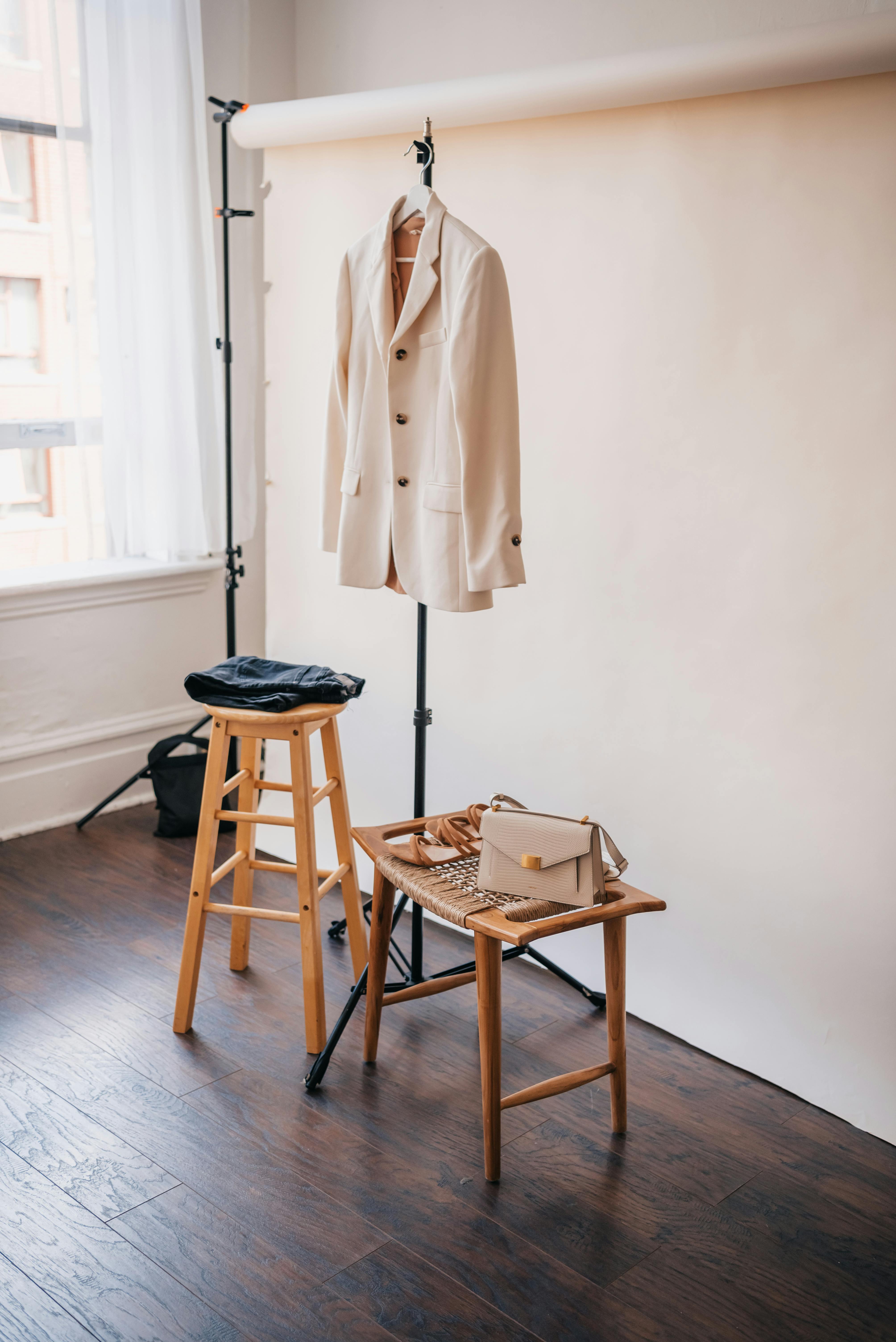 A Blazer Hanging on a Clothes Hanger · Free Stock Photo