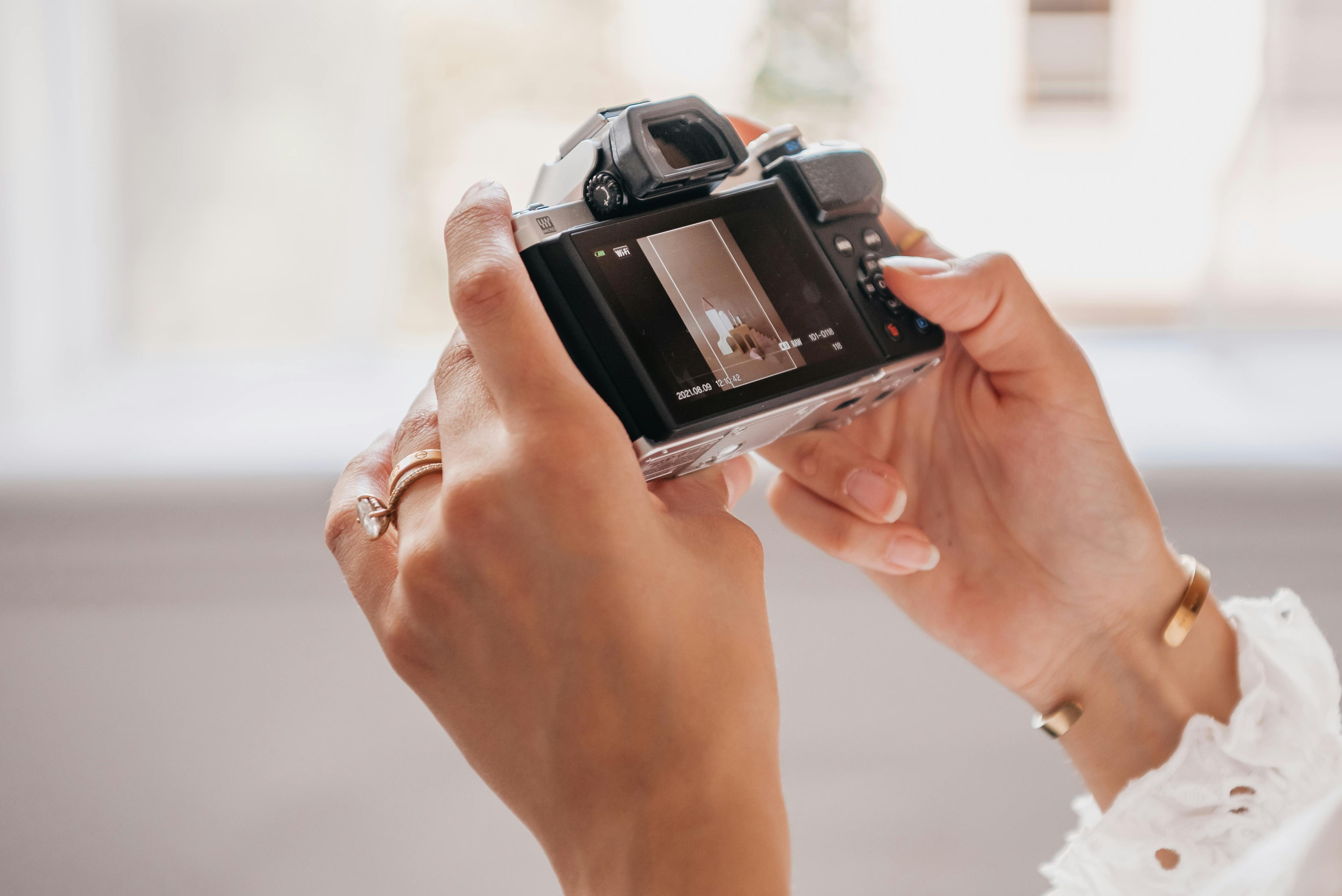Hands Holding Camera · Free Stock Photo