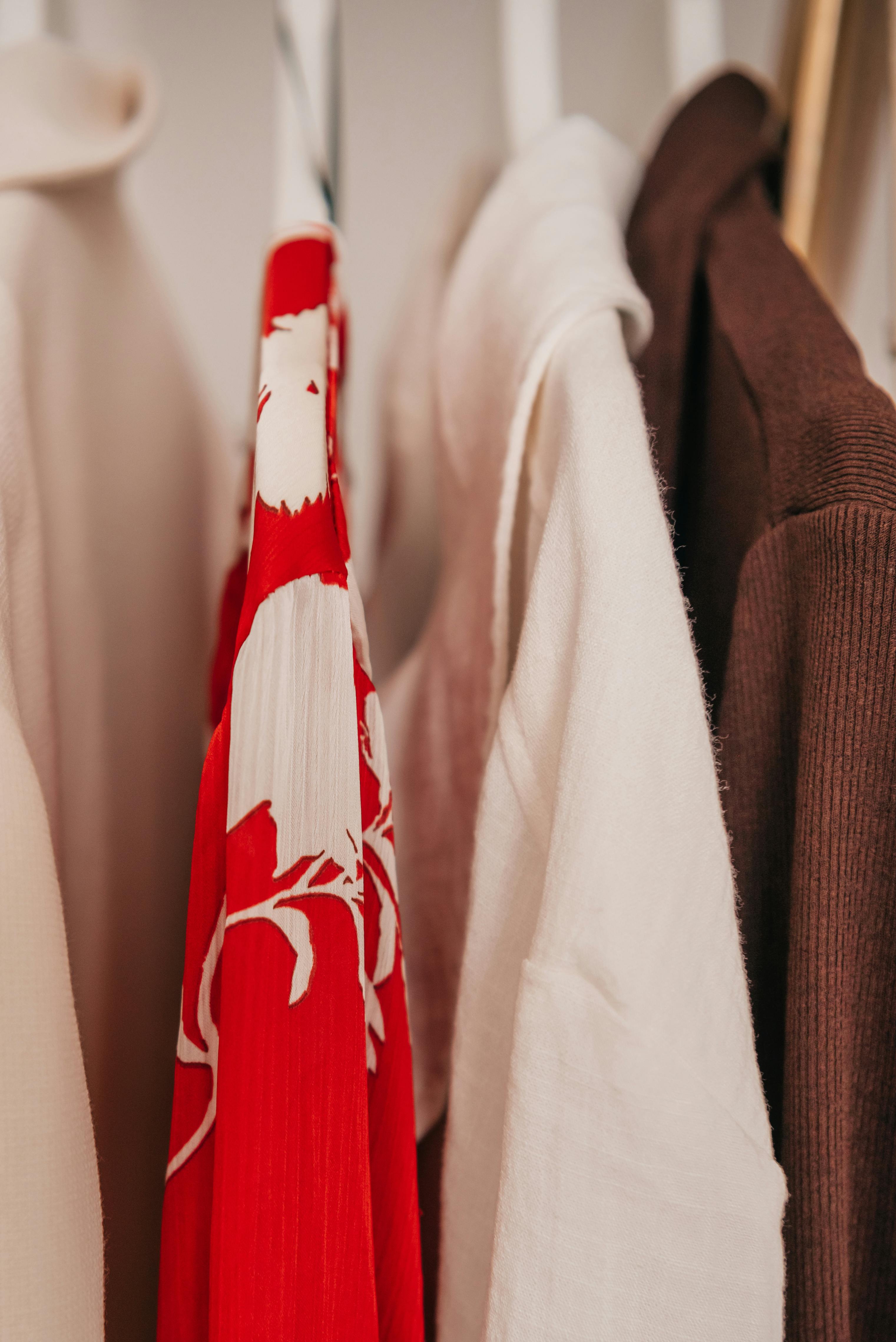 Hanging Clothes in Close-up Photography · Free Stock Photo