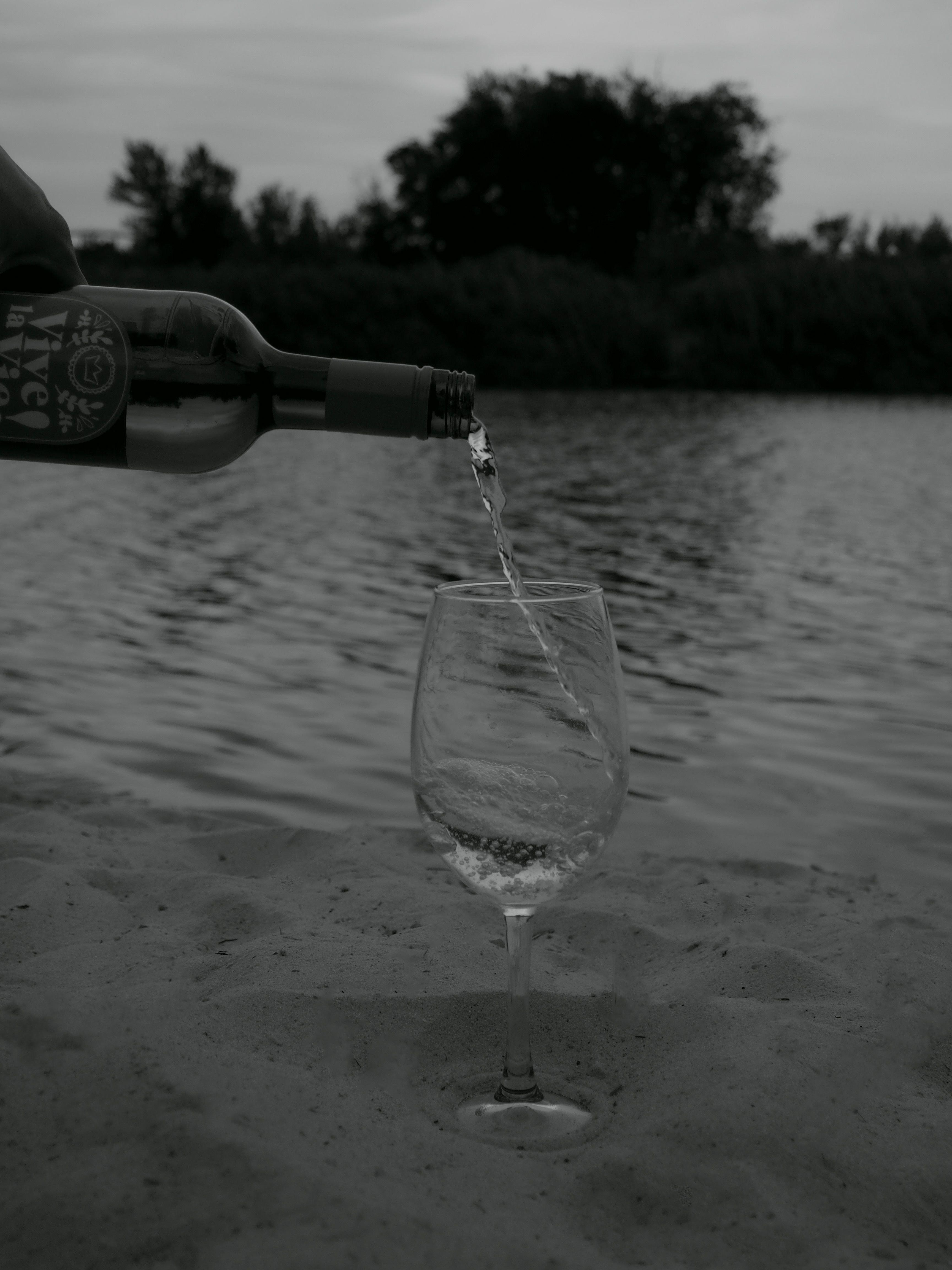 Grayscale Photo of Drink Being Poured · Free Stock Photo