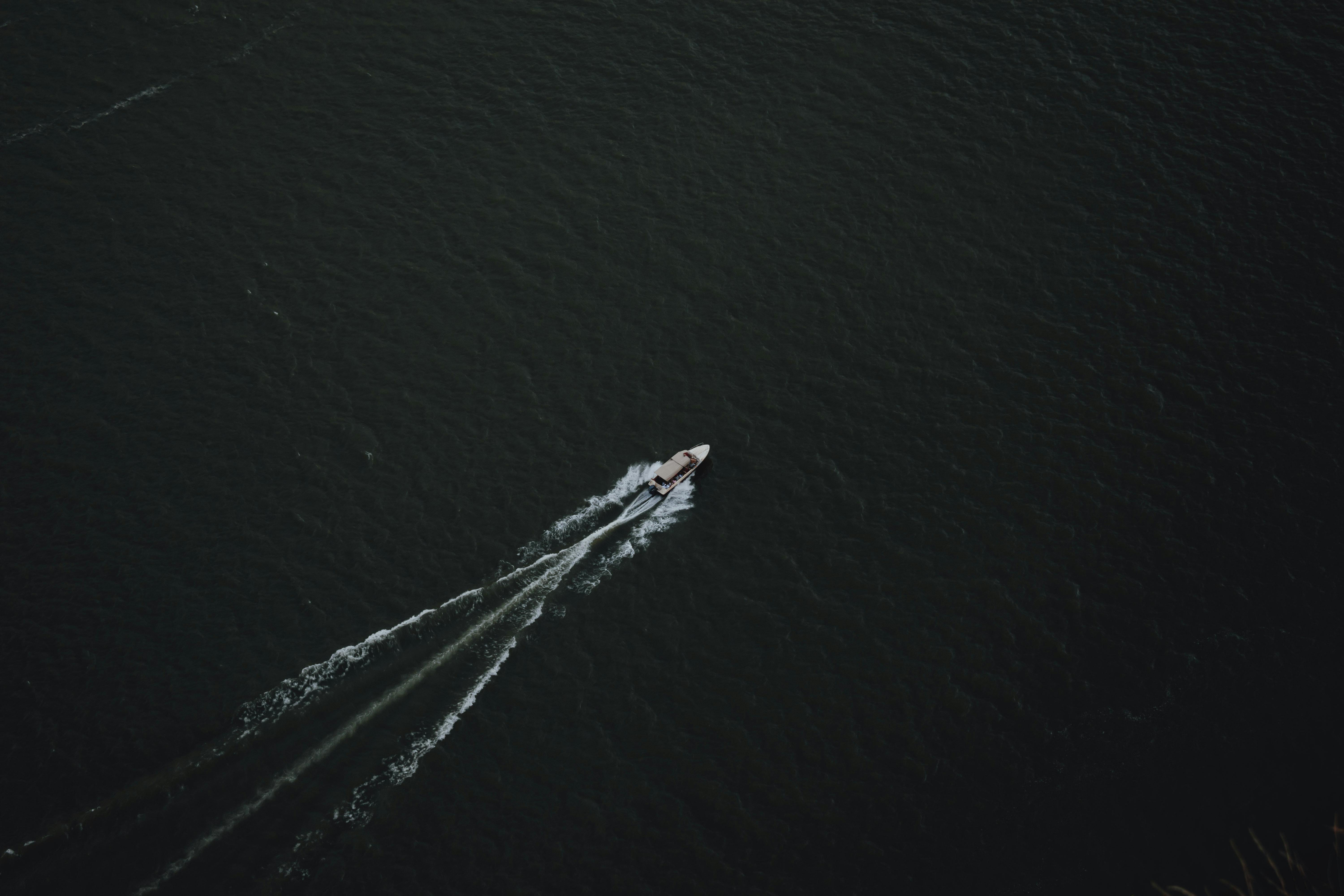 Aerial View of a Boat on Sea · Free Stock Photo