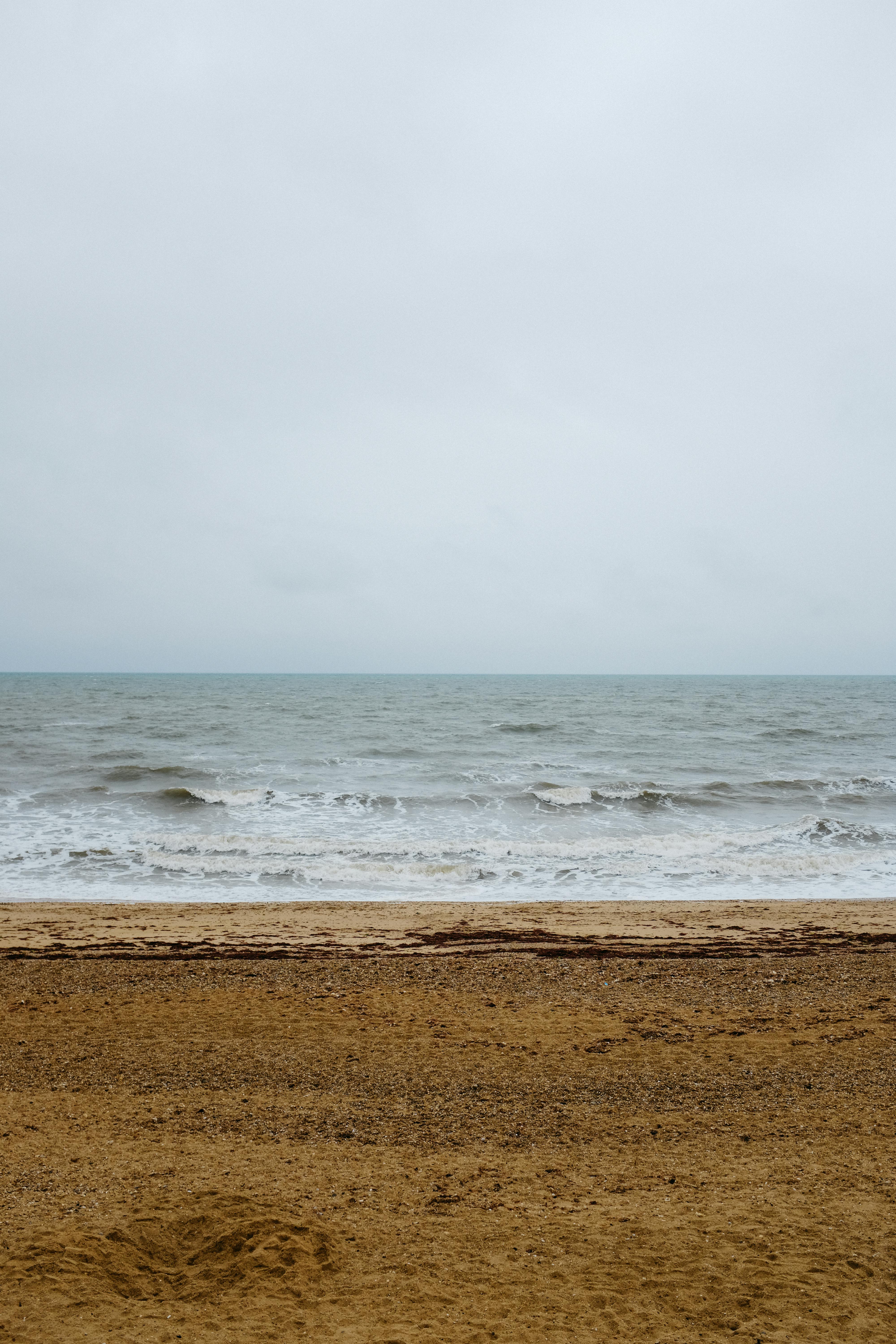 Calm Seaside Landscape with Sandy Beach · Free Stock Photo