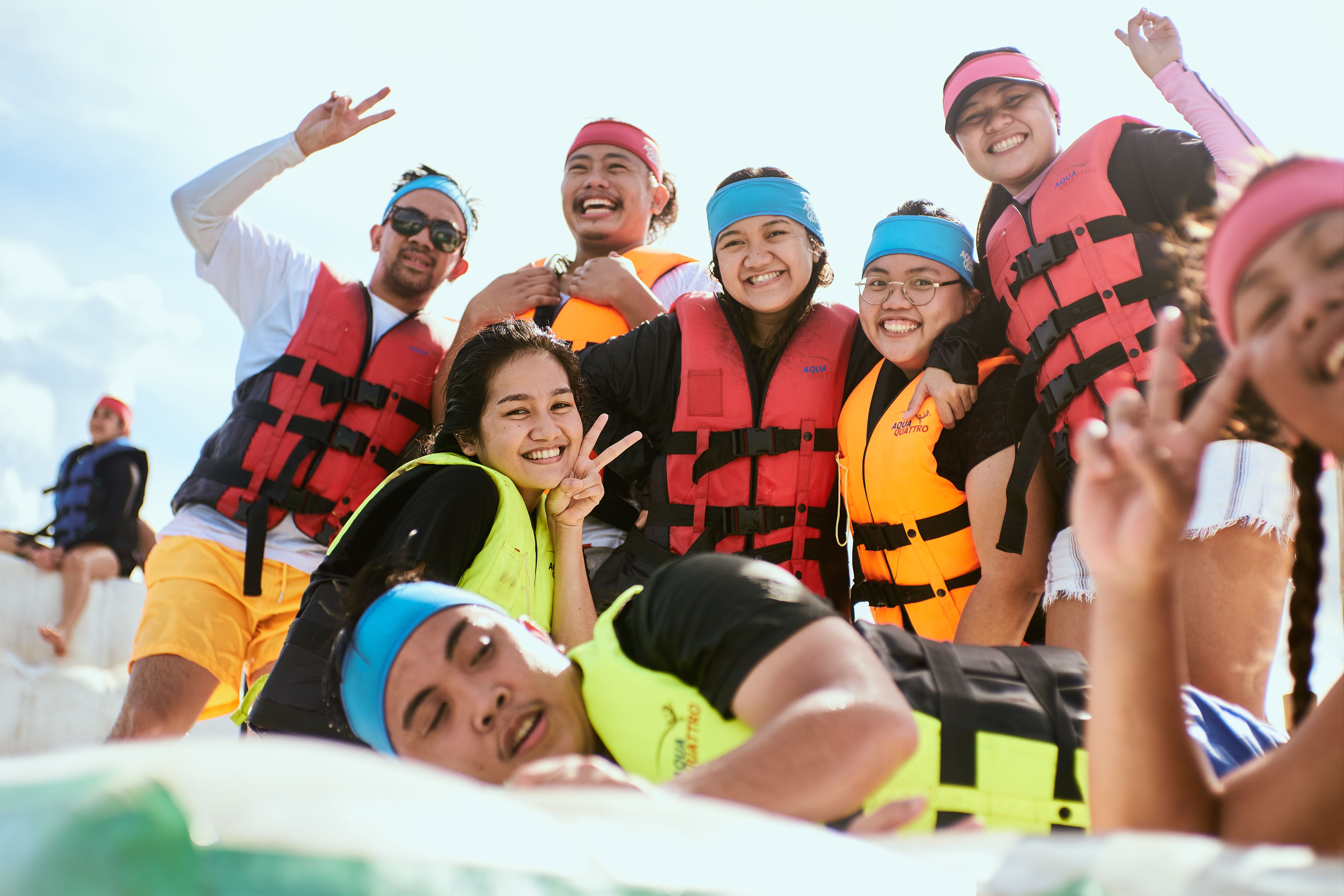 A Group of People Wearing Life Vests · Free Stock Photo
