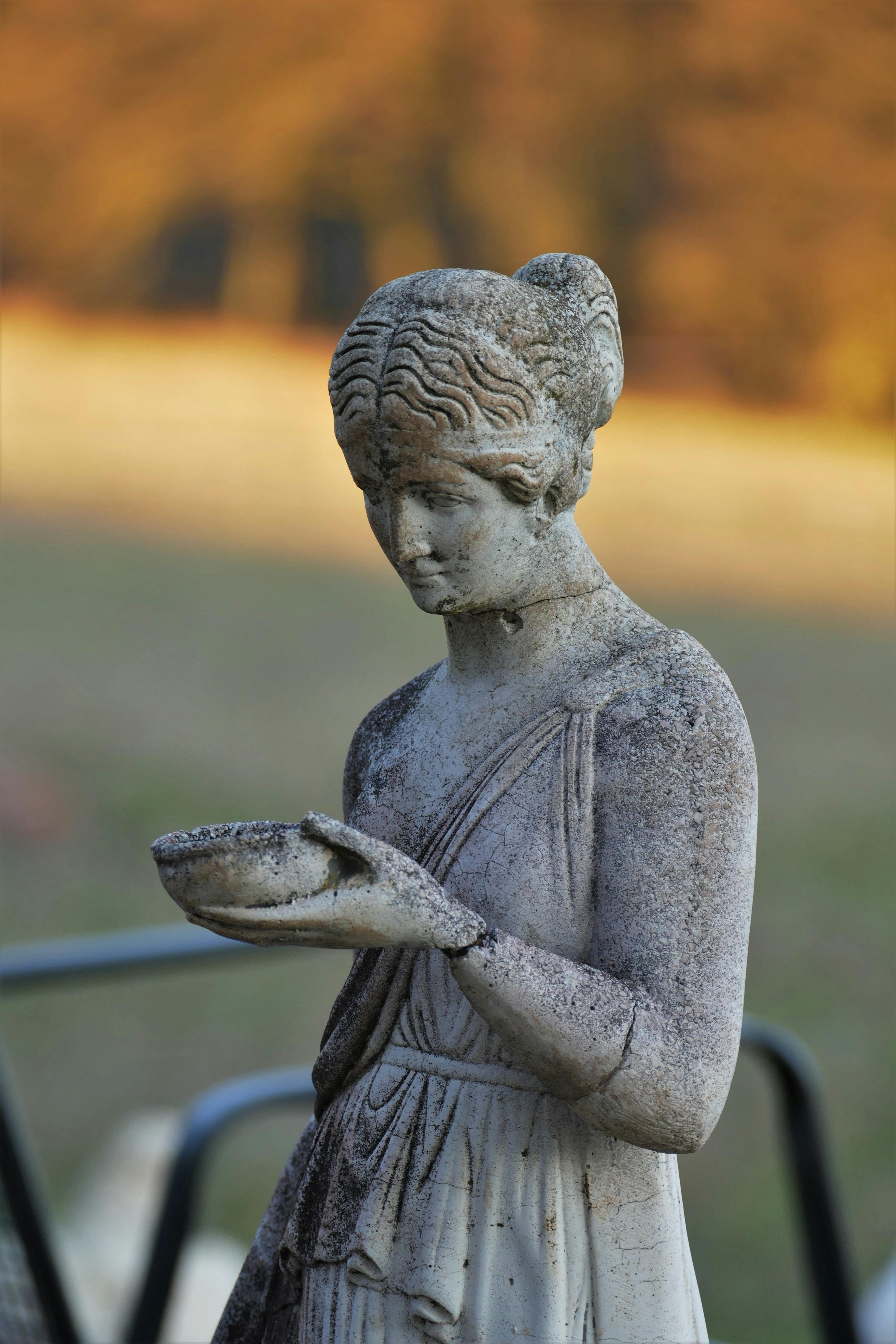 Gray Concrete Statue of a Woman · Free Stock Photo